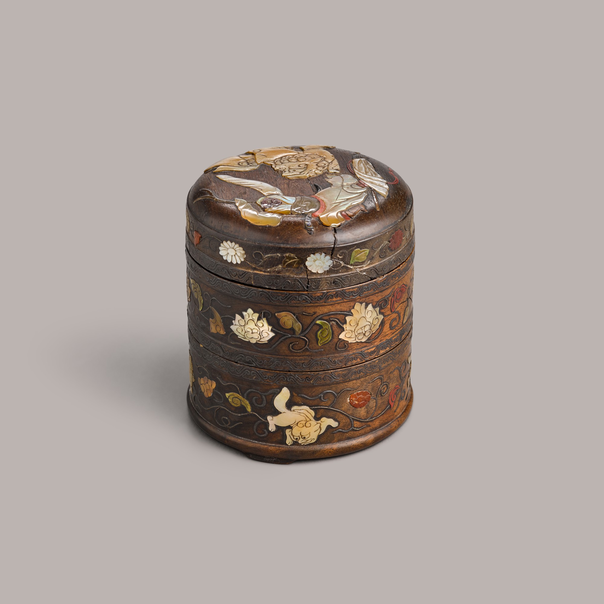 A two-tier mother-of-pearl inlaid zitan box and cover, Qing dynasty ...