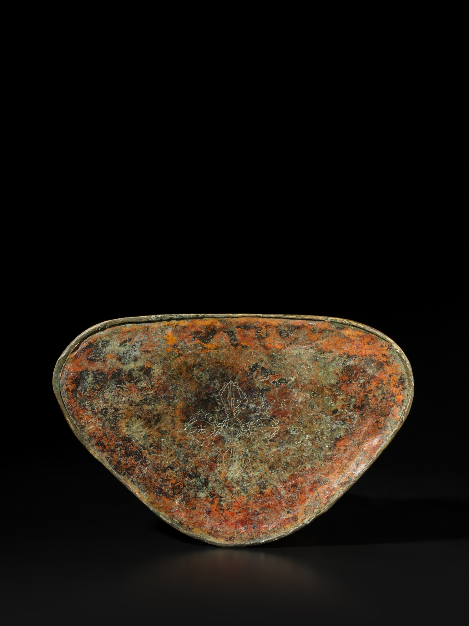 A large copper and silver-inlaid copper alloy figure of the First ...