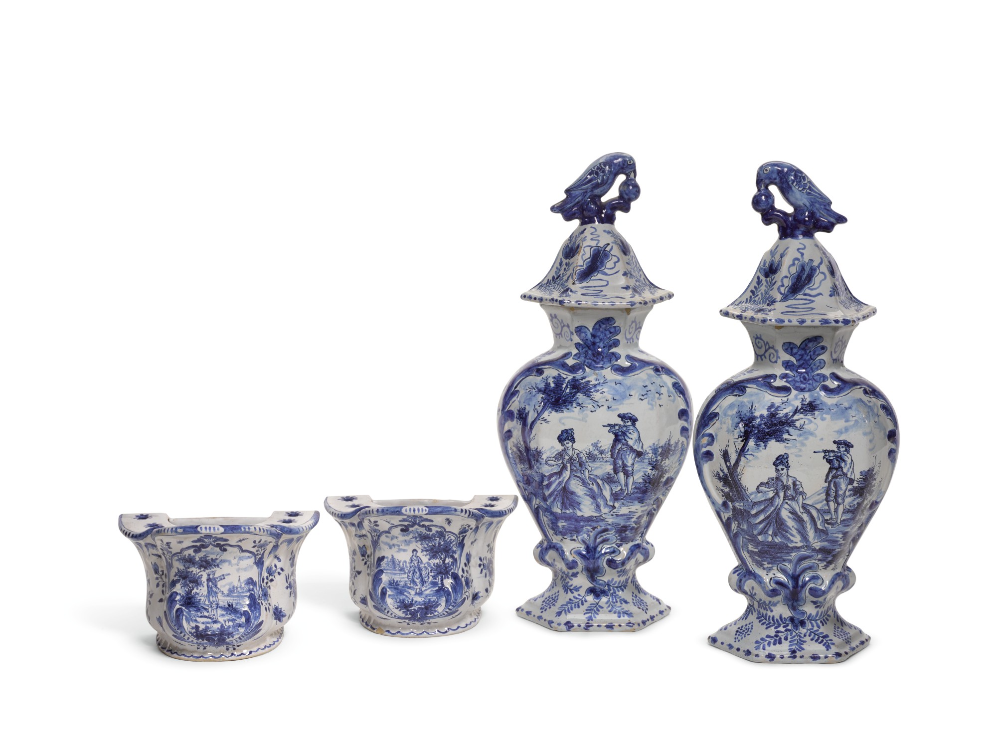A pair of Dutch Delft hexagonal baluster vases and covers, 19th century ...