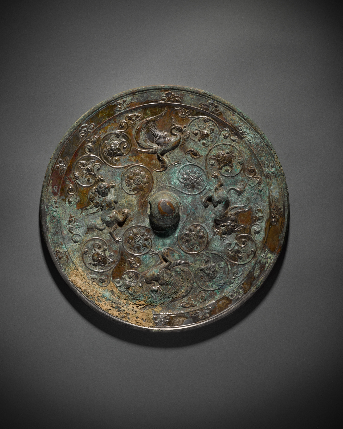 A large bronze mirror, Tang dynasty | 唐 銅雙鳳狻猊紋鏡 | The Edith & Stuart ...