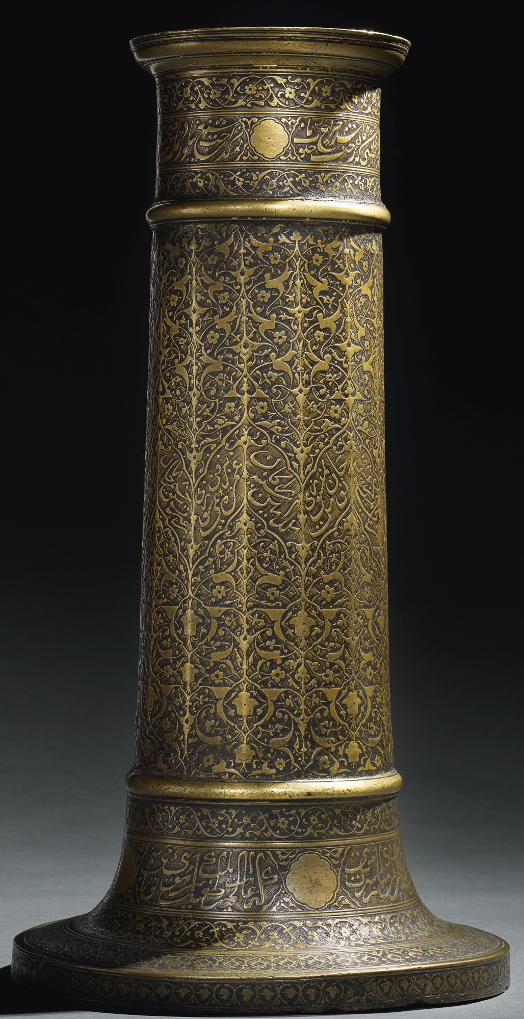 A MONUMENTAL SAFAVID ENGRAVED BRASS TORCHSTAND, PERSIA, 16TH CENTURY ...