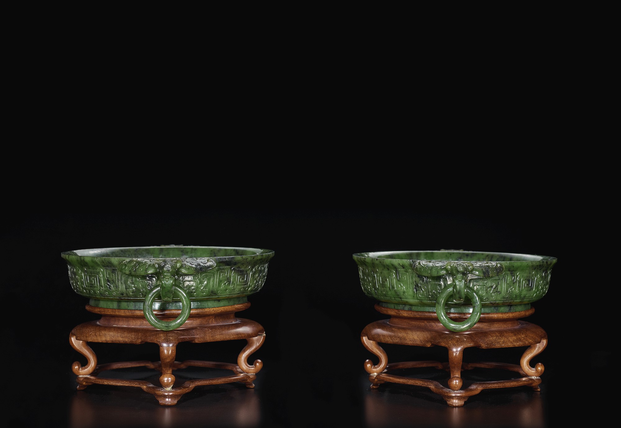 A pair of spinach-green jade shallow bowls, Qing dynasty, 19th / 20th ...