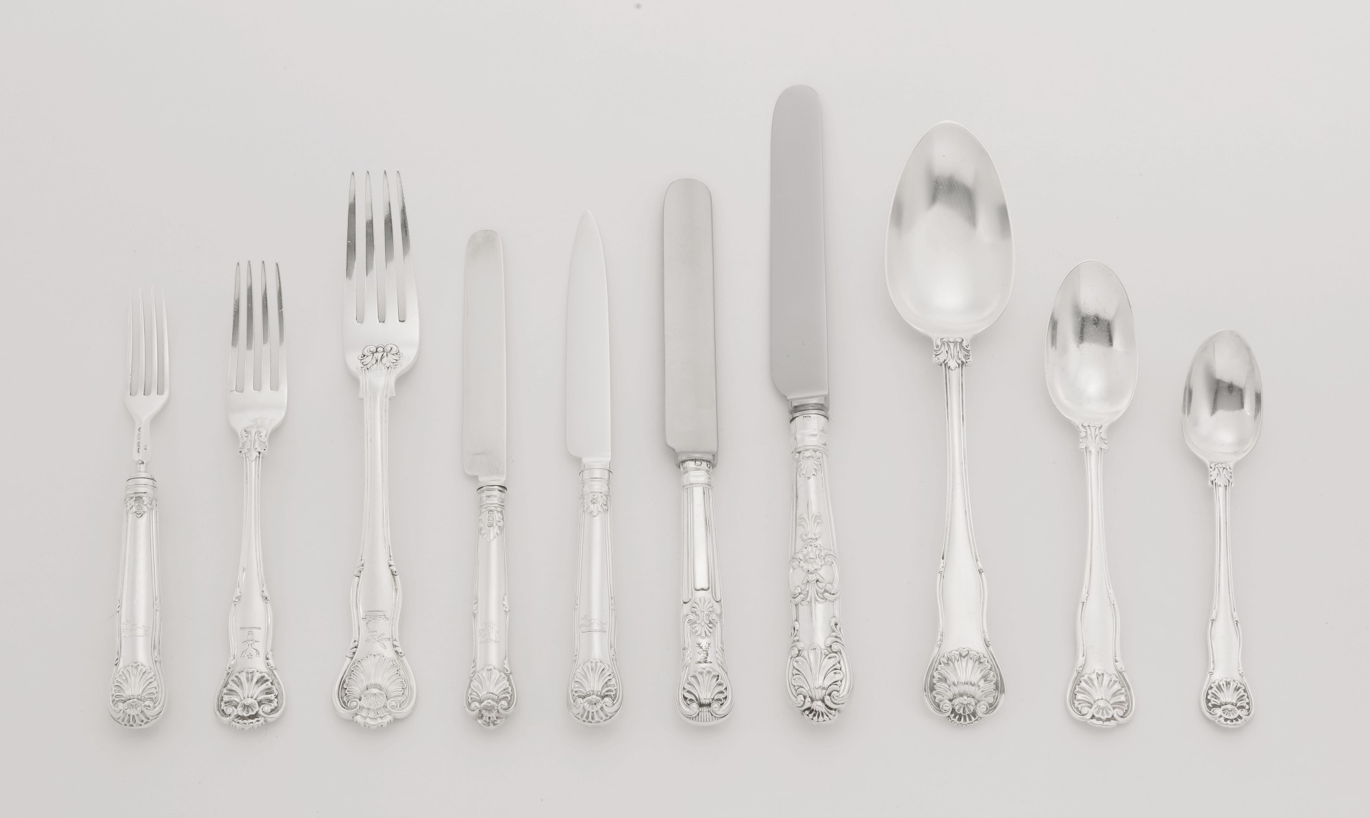AN ASSEMBLED GEORGIAN AND VICTORIAN SILVER FLATWARE SERVICE, MOST ...
