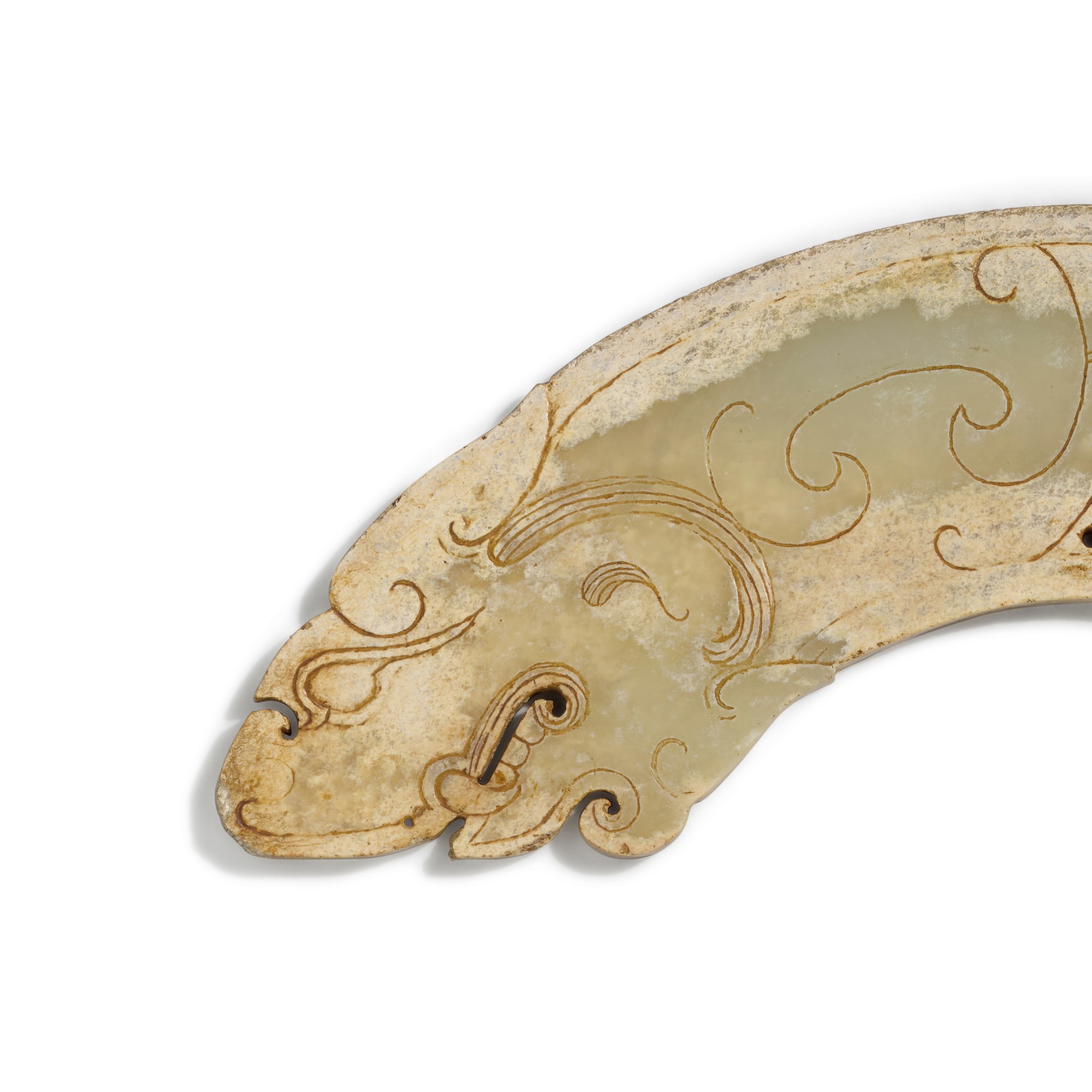 A rare celadon jade arc-shaped pendant, huang, Late Eastern Zhou ...