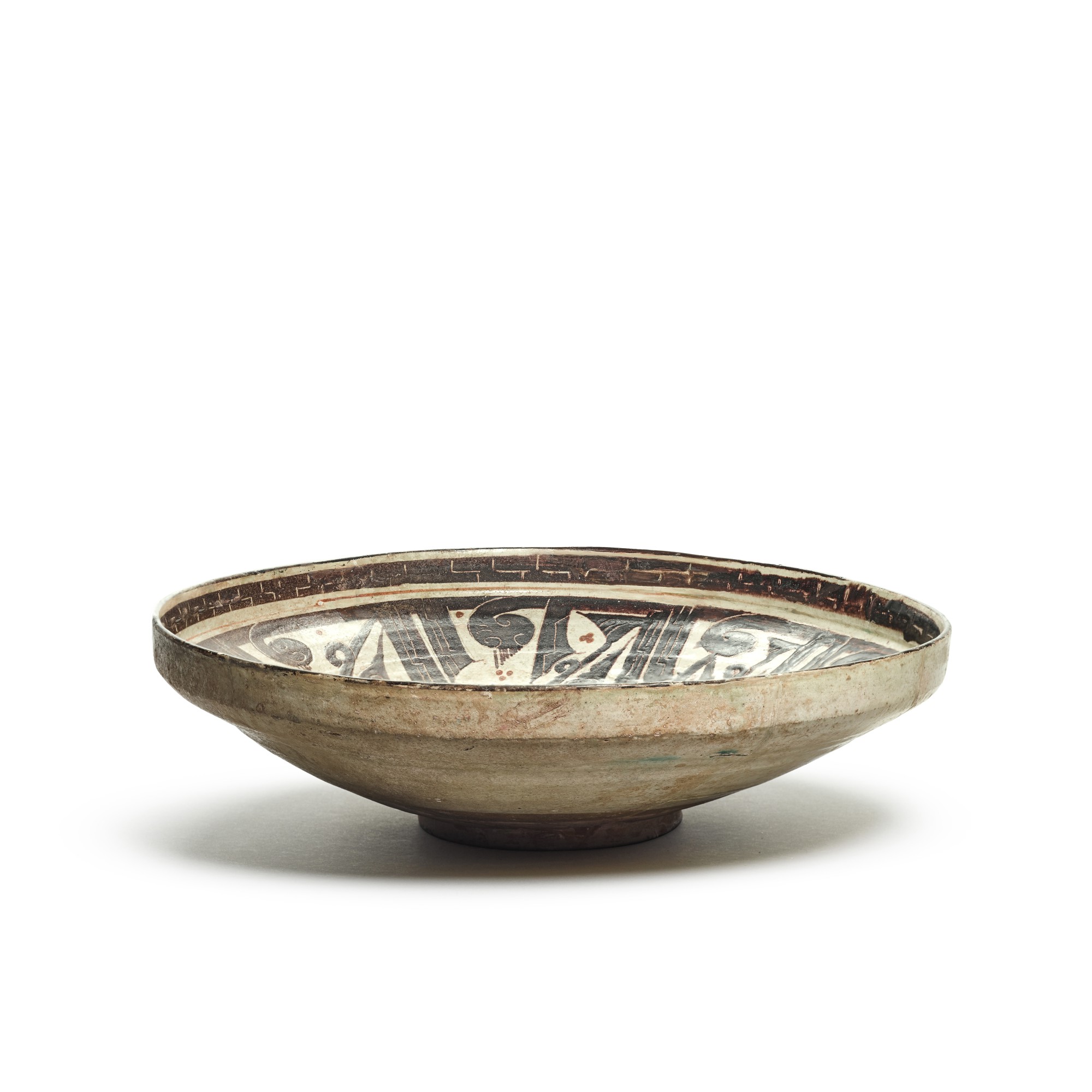 A large bowl with an inscription in floriated Kufic, Eastern Persia or ...