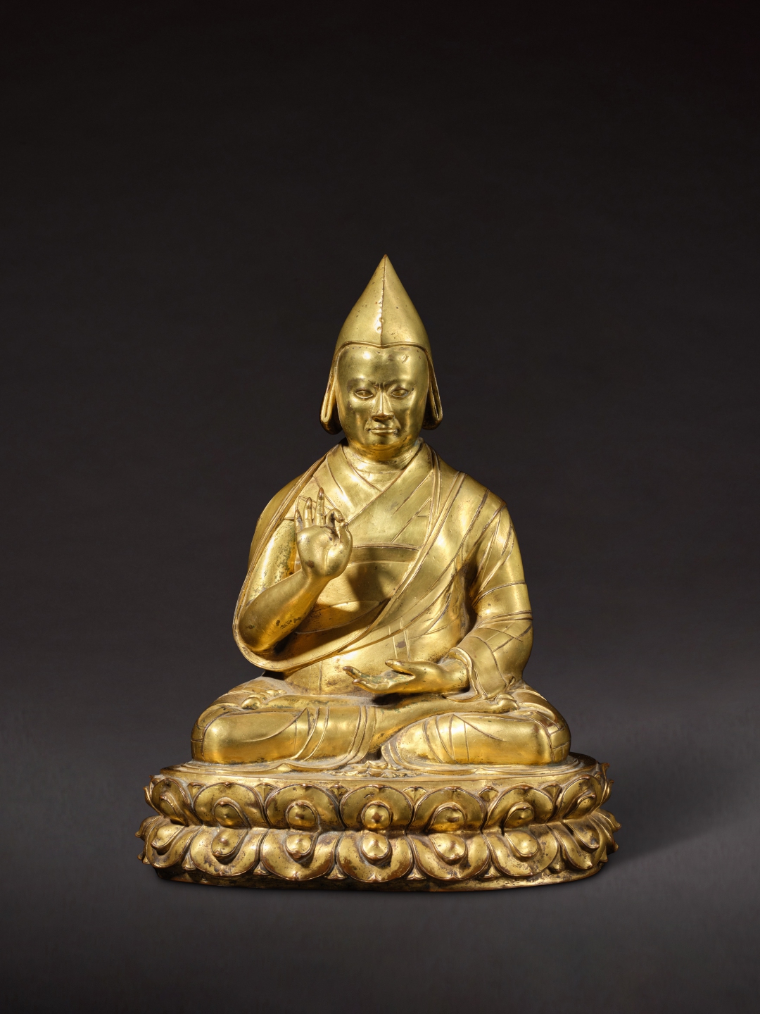 A large inscribed gilt-copper alloy figure of Kunga Rinchen Gyatso ...