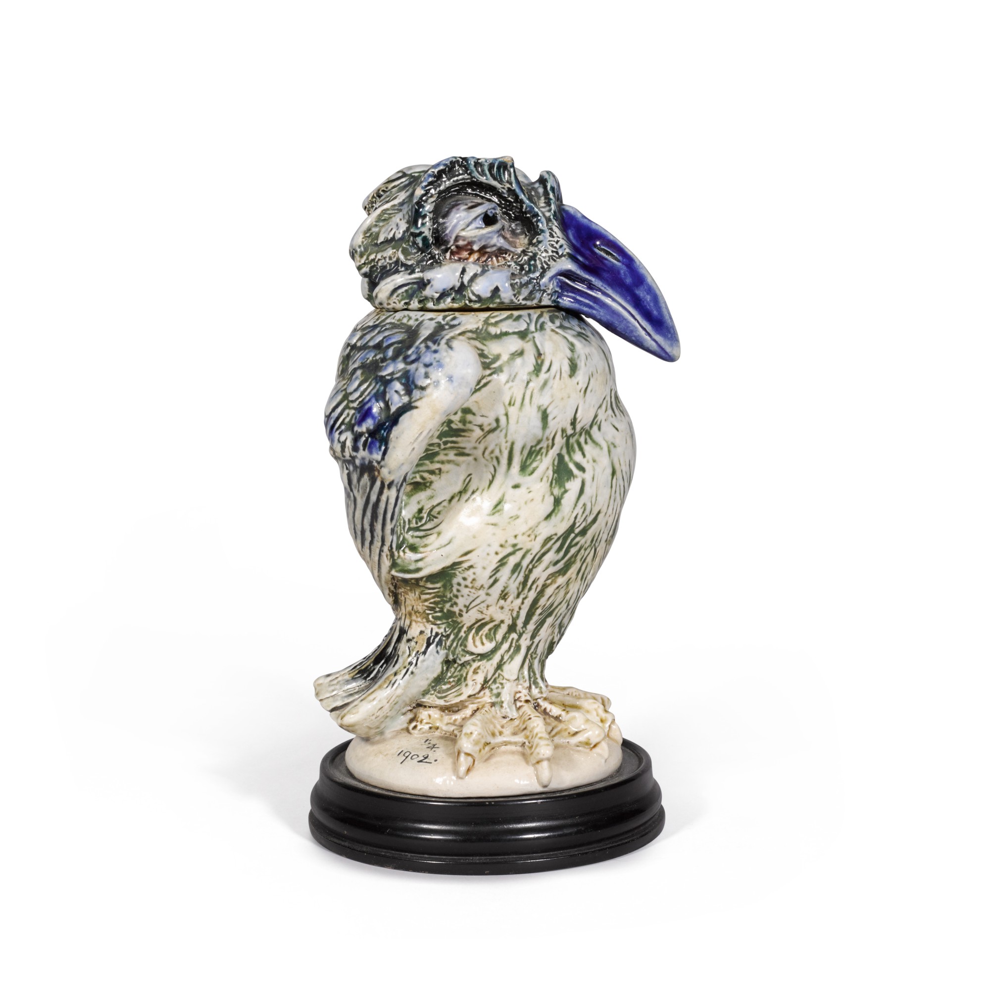 A Martin Brothers stoneware `Wally Bird' tobacco jar and cover by ...
