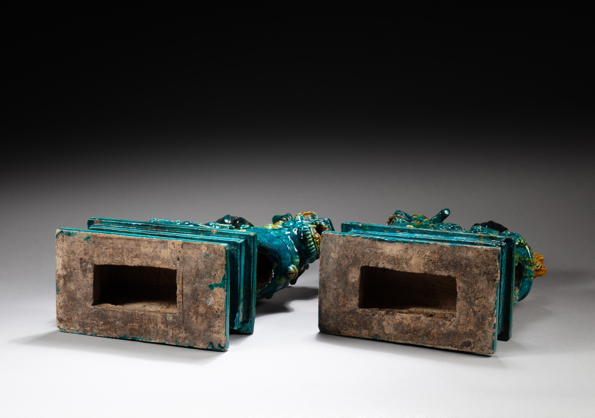 A pair of turquoise-and-yellow-glazed 'qilin' candlesticks 17th-18th ...