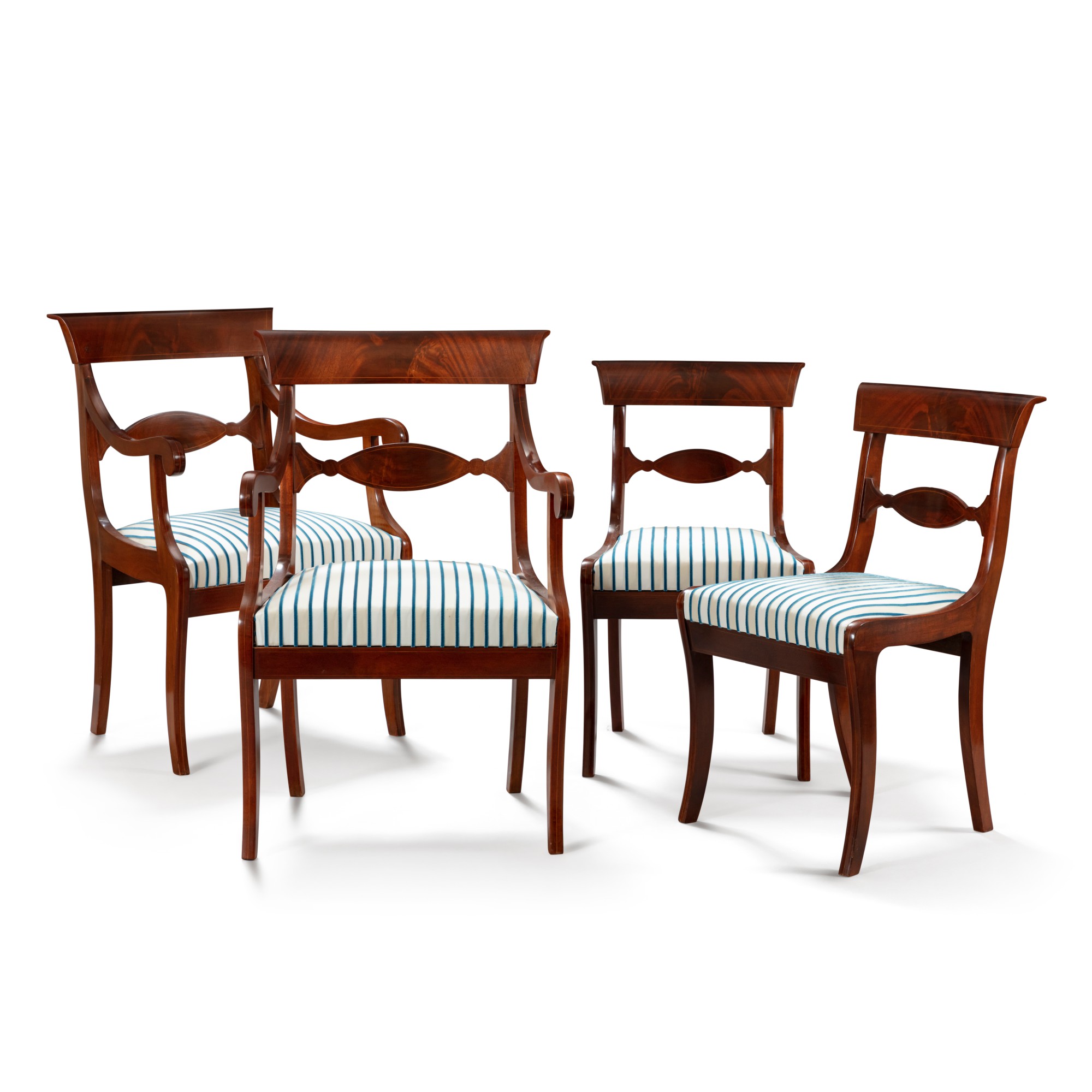 A pair of North German Georgian style mahogany armchairs with two ...