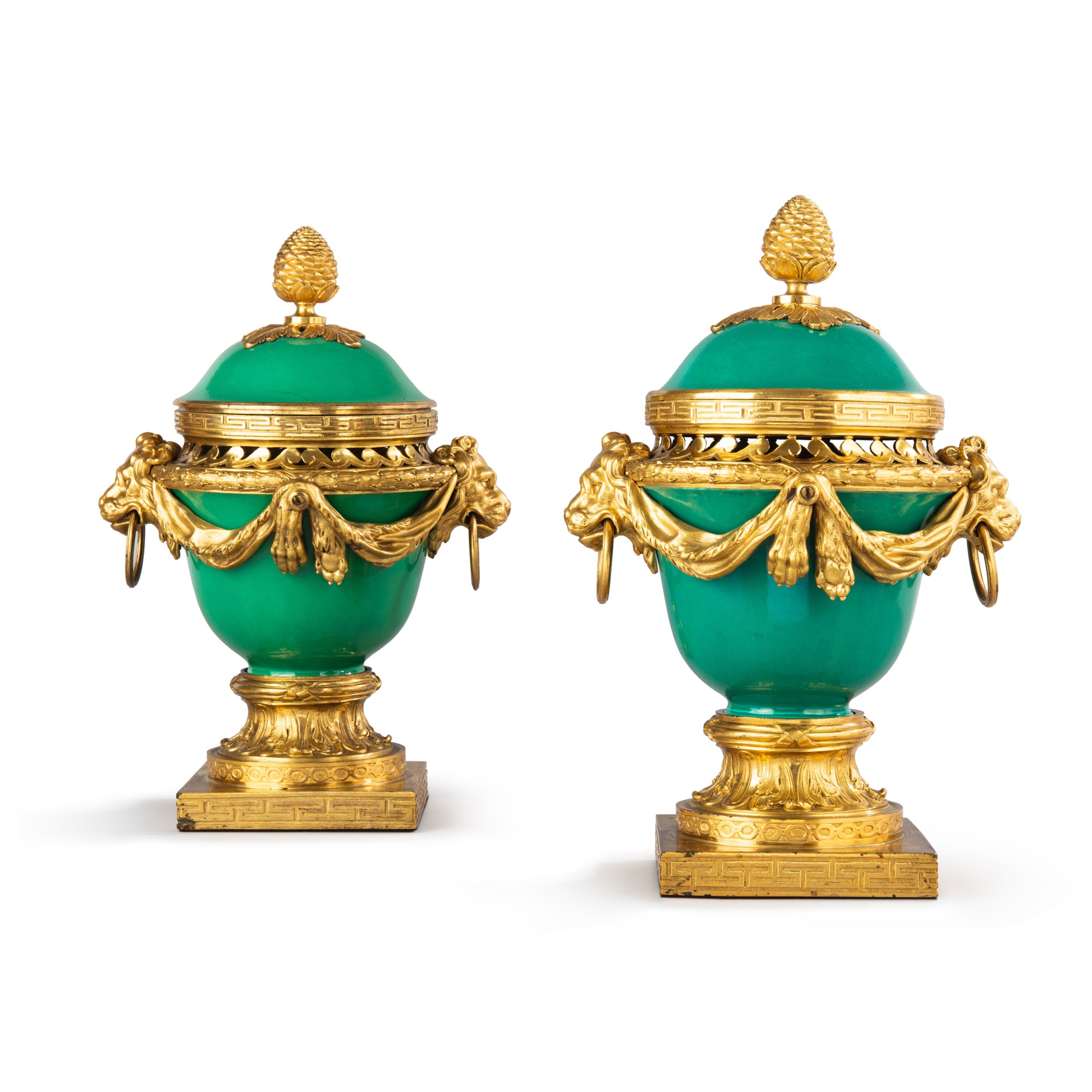 A pair of Louis XVI gilt-bronze mounted and apple-green Sèvres ...