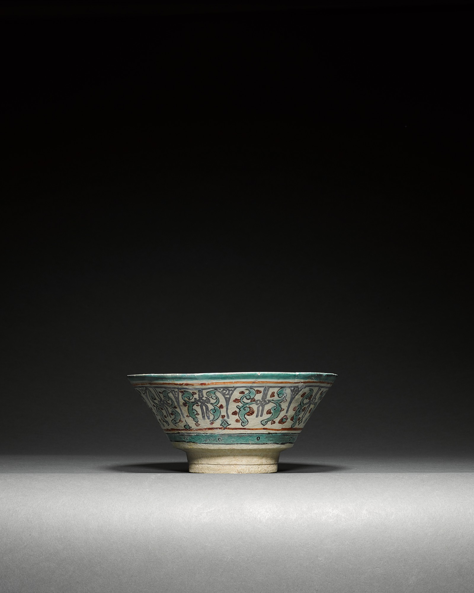 A fine minai pottery bowl depicting a horseman, Persia, late 12th-early ...