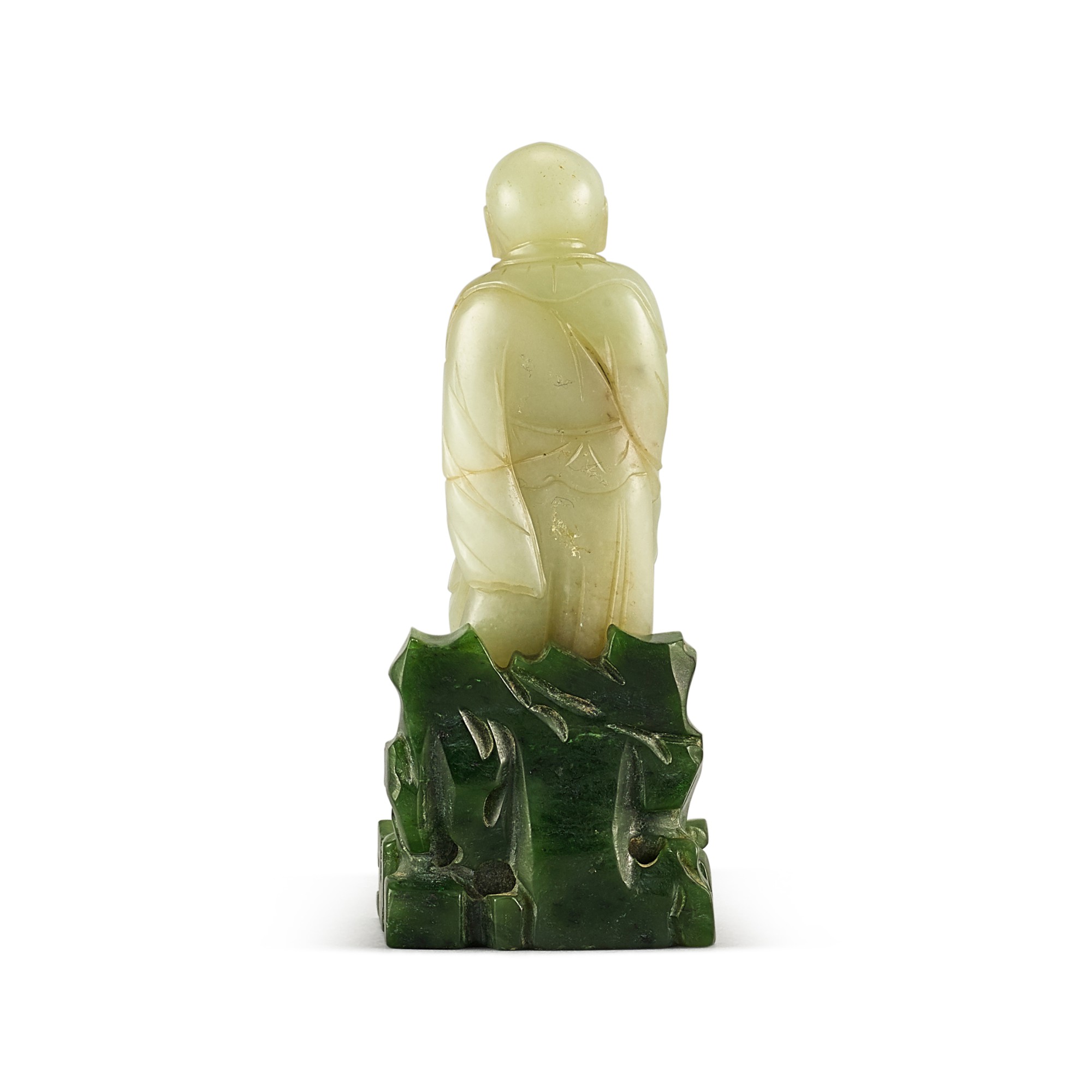 A WHITE JADE 'LUOHAN' GROUP AND A SPINACH-GREEN JADE STAND LATE QING ...