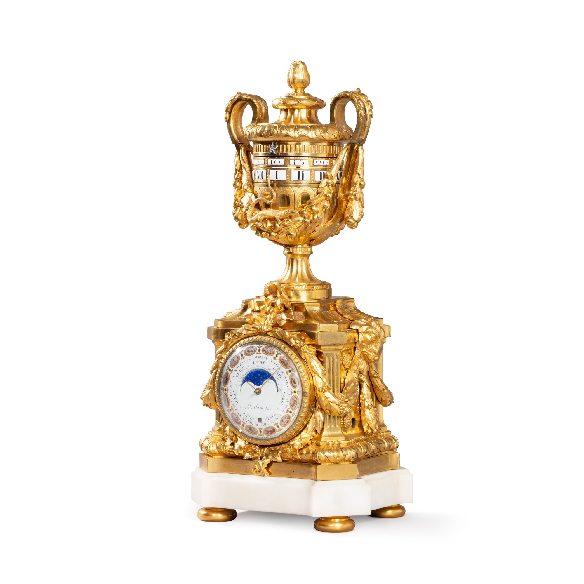A Louis XVI striking and astronomical vase clock with revolving chapter rings "pendule à cercles ...