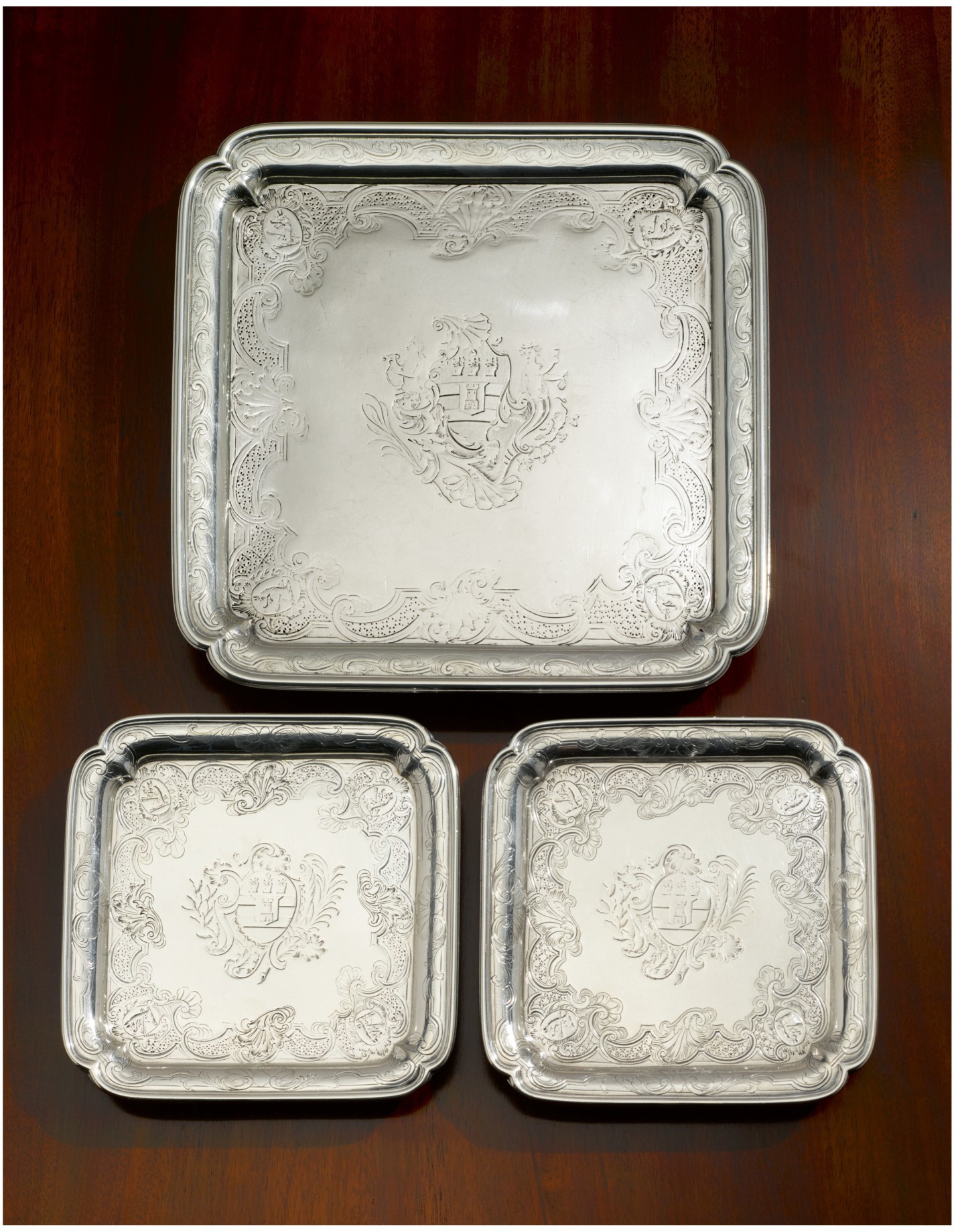 A GEORGE II SILVER SALVER AND PAIR OF MATCHING WAITERS, PAUL DE LAMERIE ...