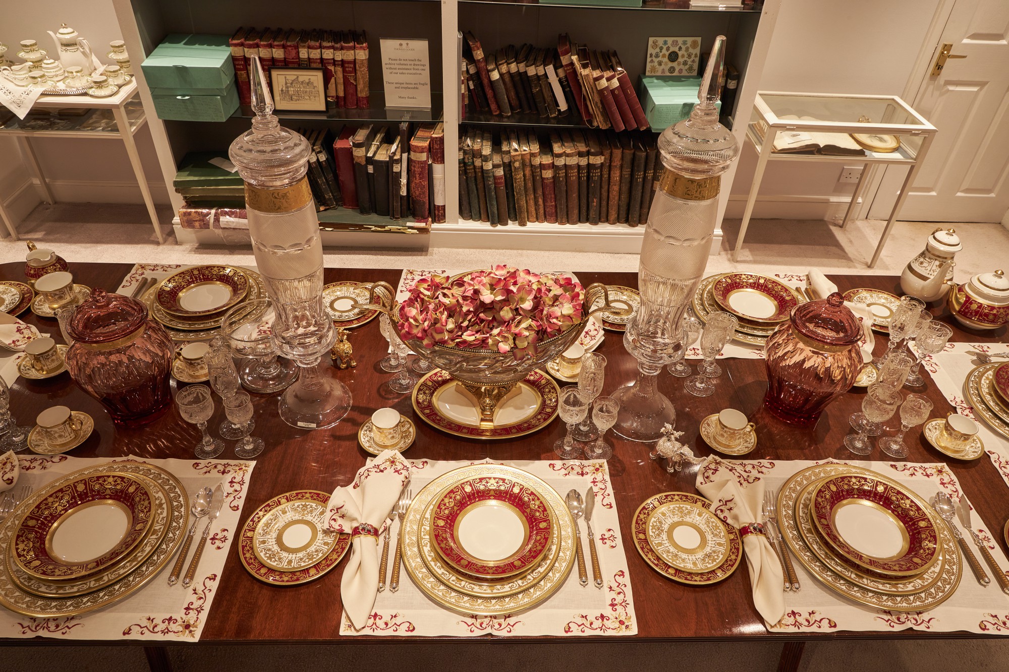 A Thomas Goode 'Florette Ruby' bone china dinner and dessert service ...