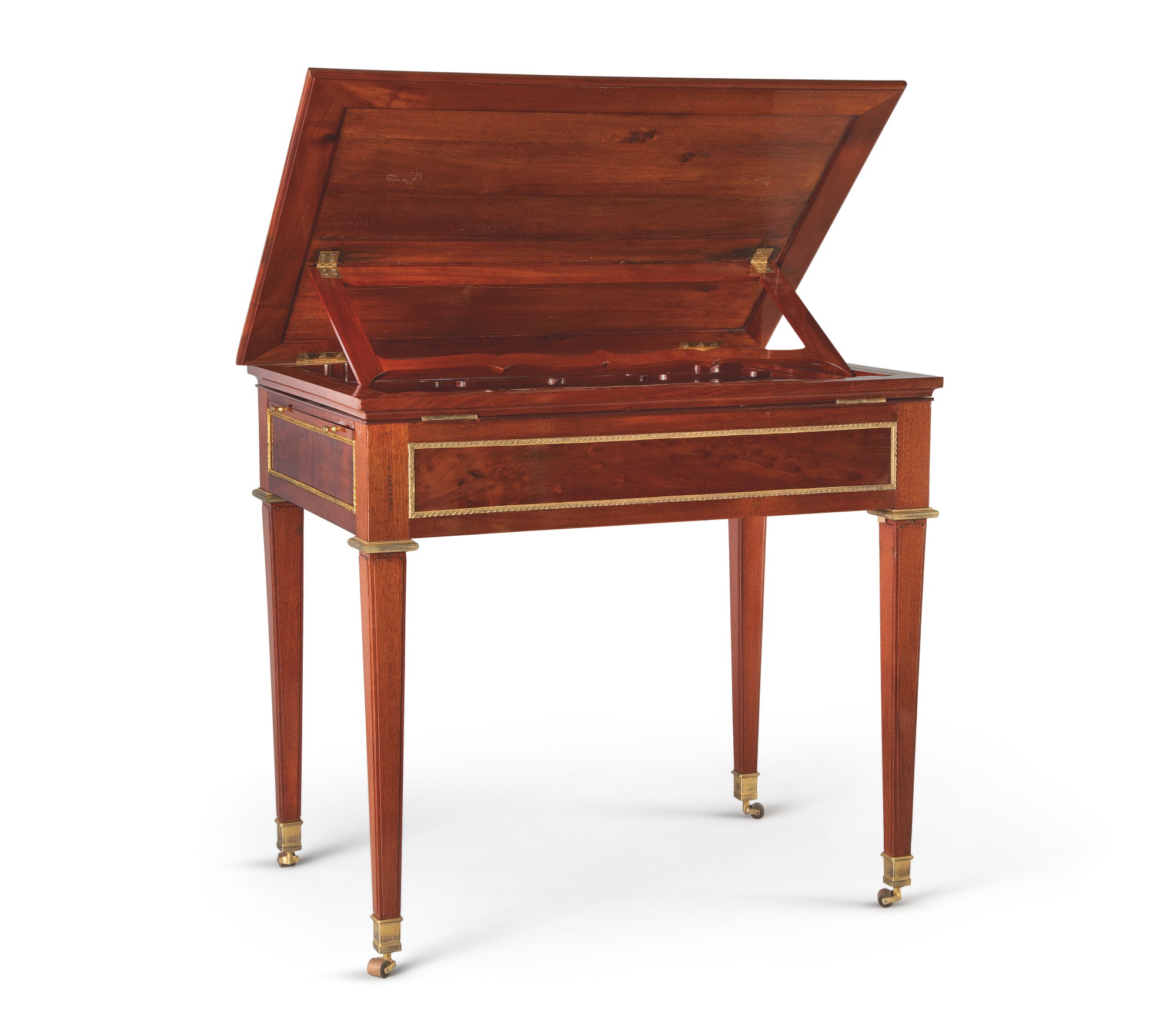 A LOUIS XVI GILT BRONZE-MOUNTED MAHOGANY TABLE A LA TRONCHIN BY ...