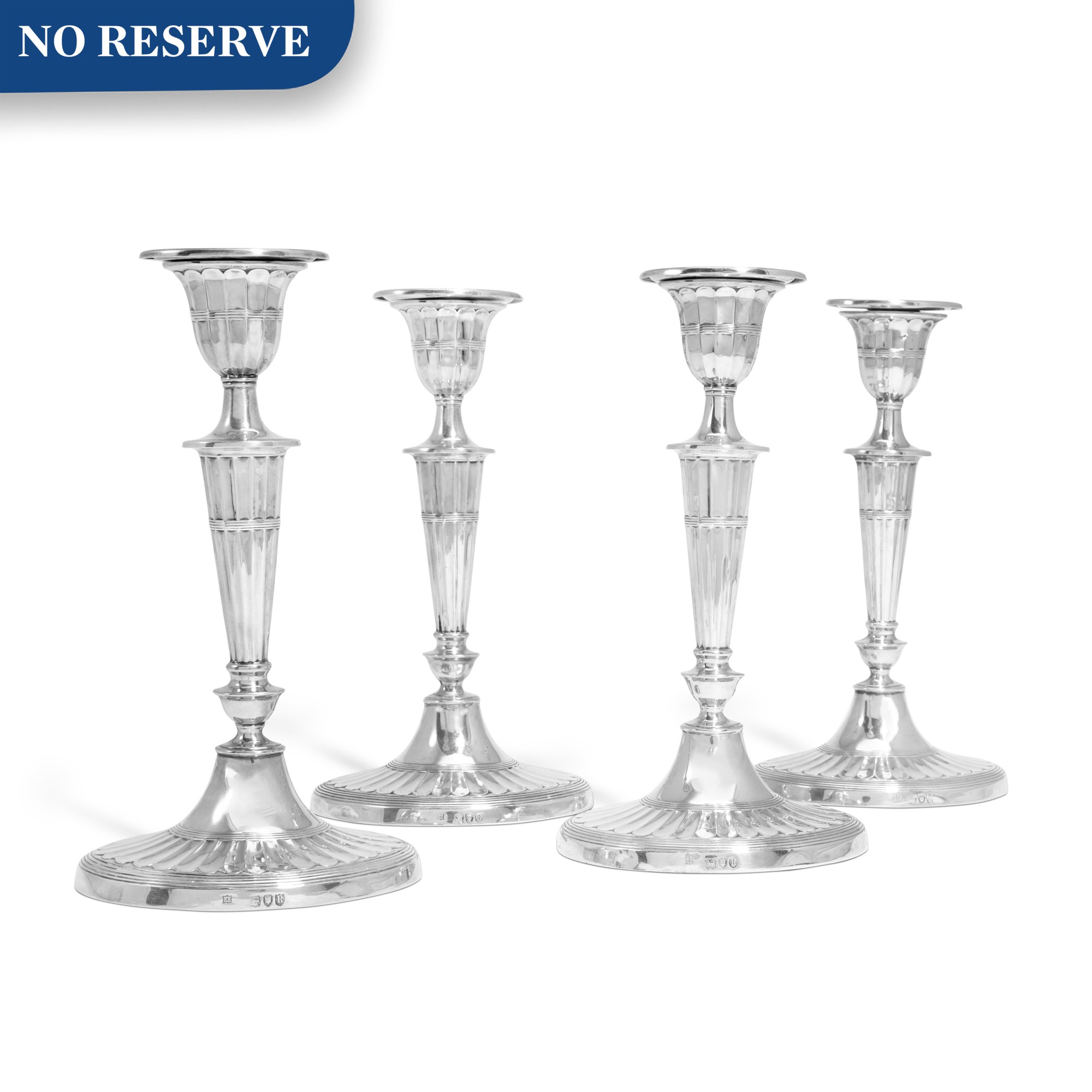 A set of four Victorian silver candlesticks, E. Hutton for William ...