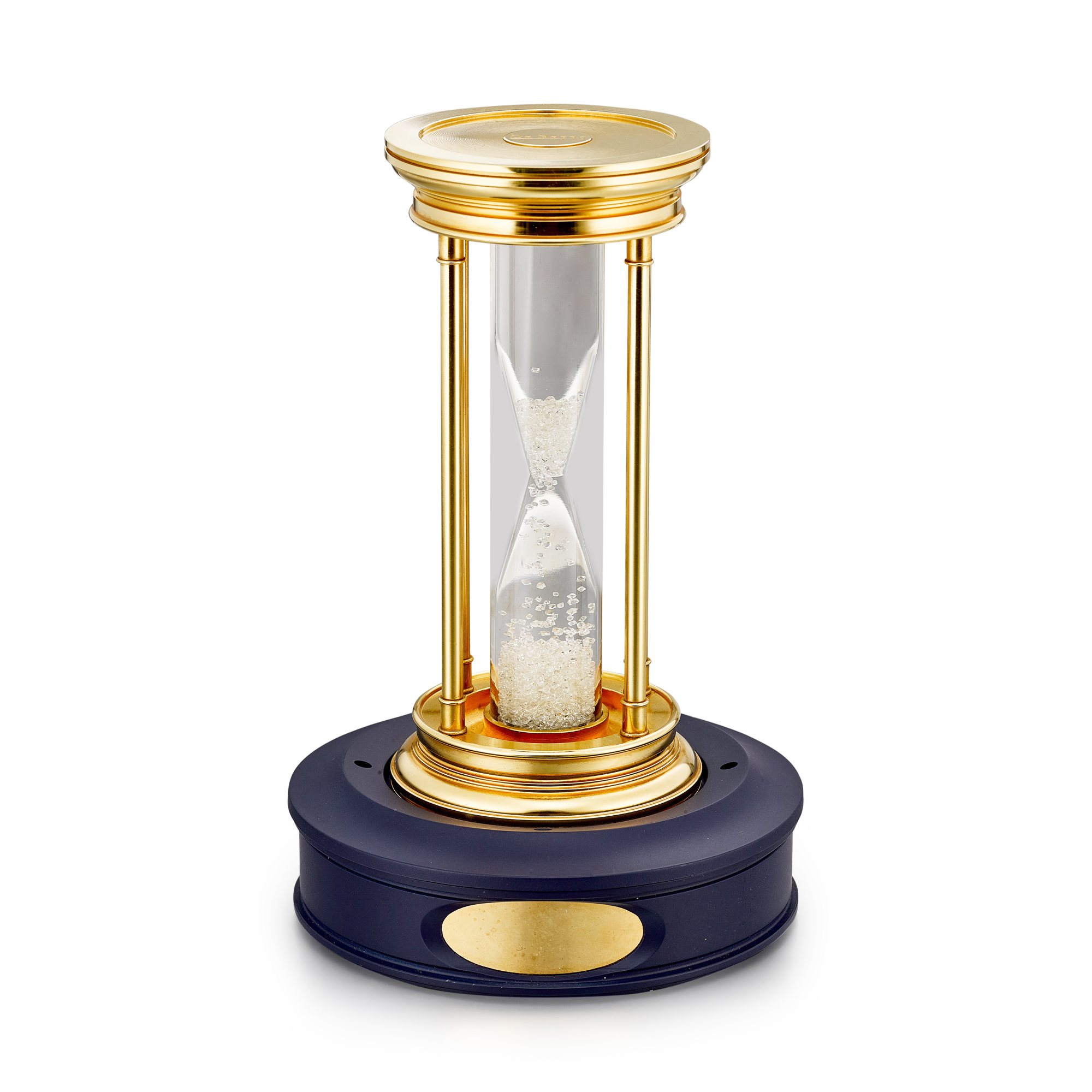 A gilt brass hourglass with floating diamonds, Circa 2000 | 鍍金銅製沙漏 ...