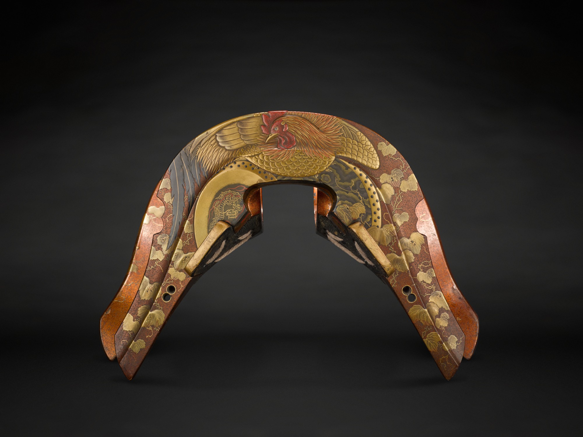 A lacquer kura [saddle], the frame with a date of Koji ninen (1556) and ...