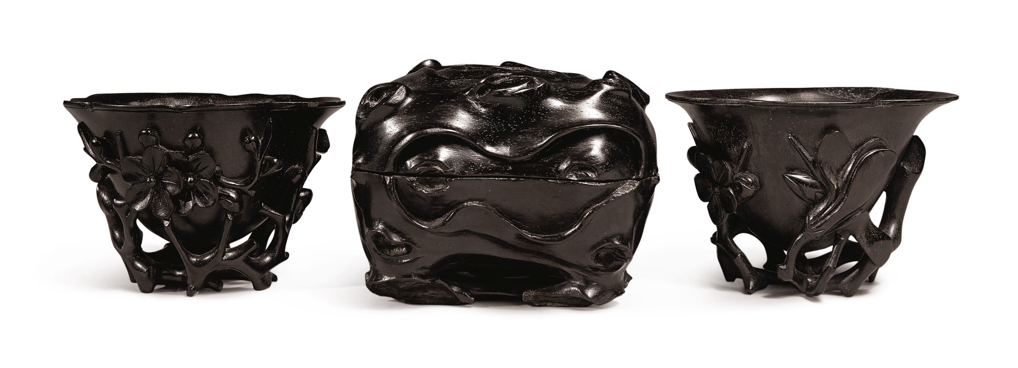 Two 'zitan' libation cups and a 'zitan' box and cover, Qing dynasty ...