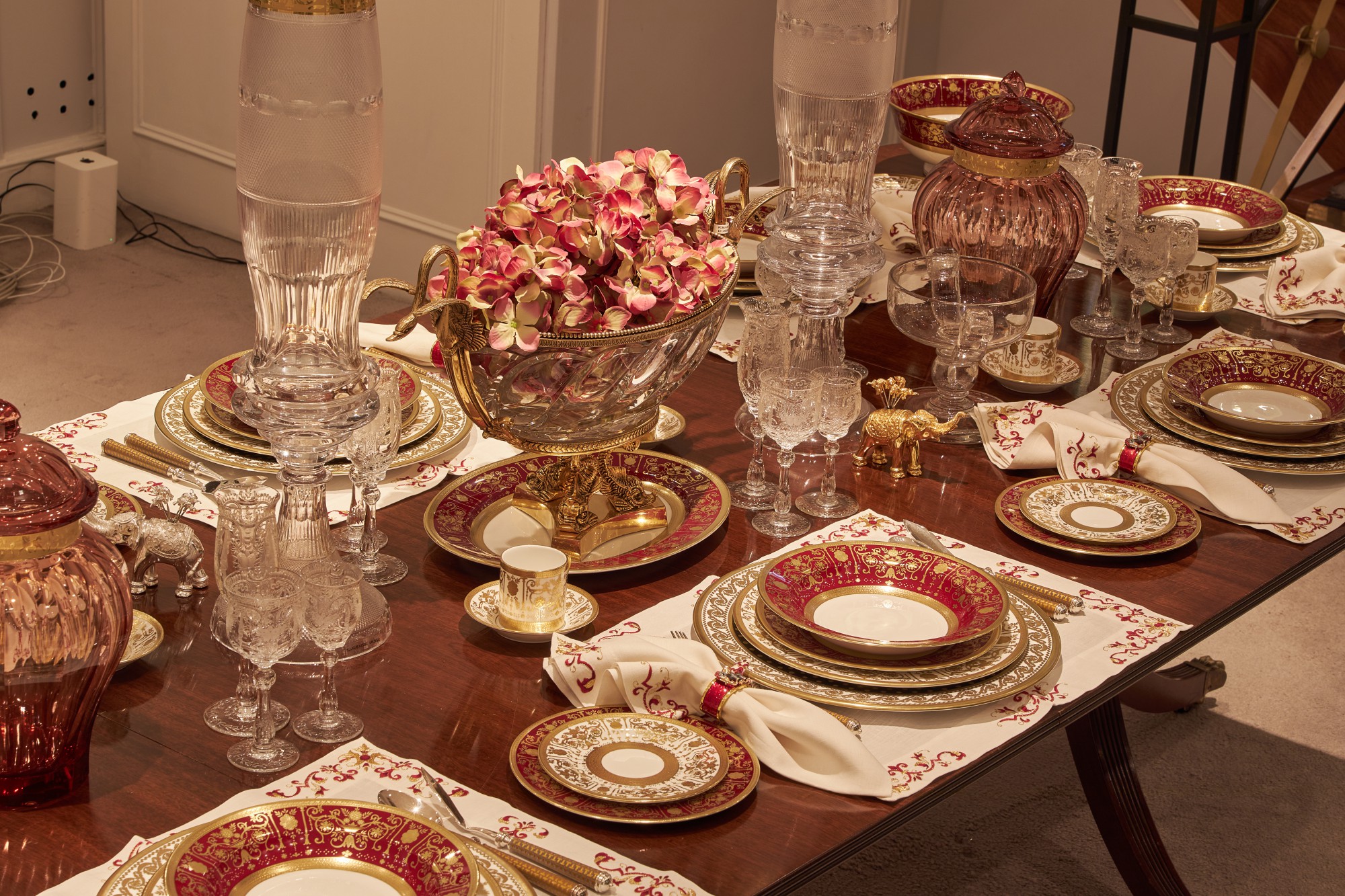 A Thomas Goode 'Florette Ruby' bone china dinner and dessert service ...