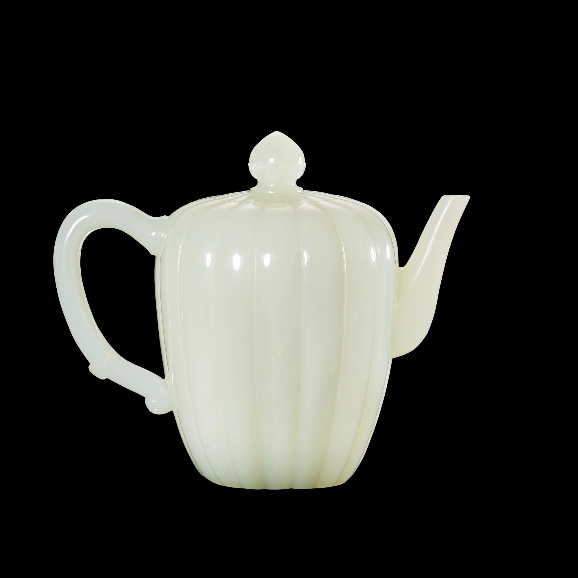 A superbly carved and exceedingly fine white jade 'lotus' fluted teapot ...