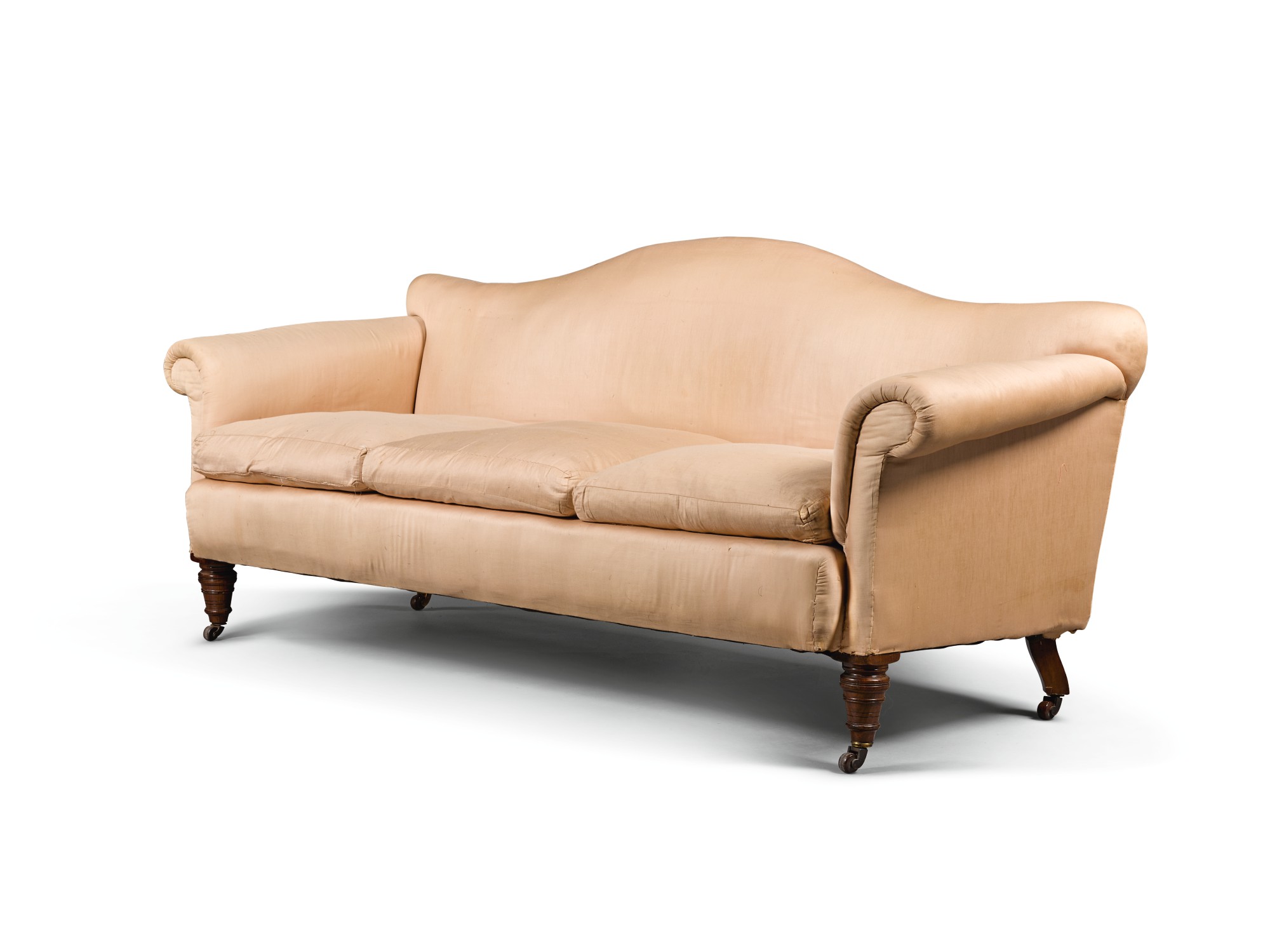 A Victorian walnut and upholstered 'camel-back' sofa, circa 1880 ...