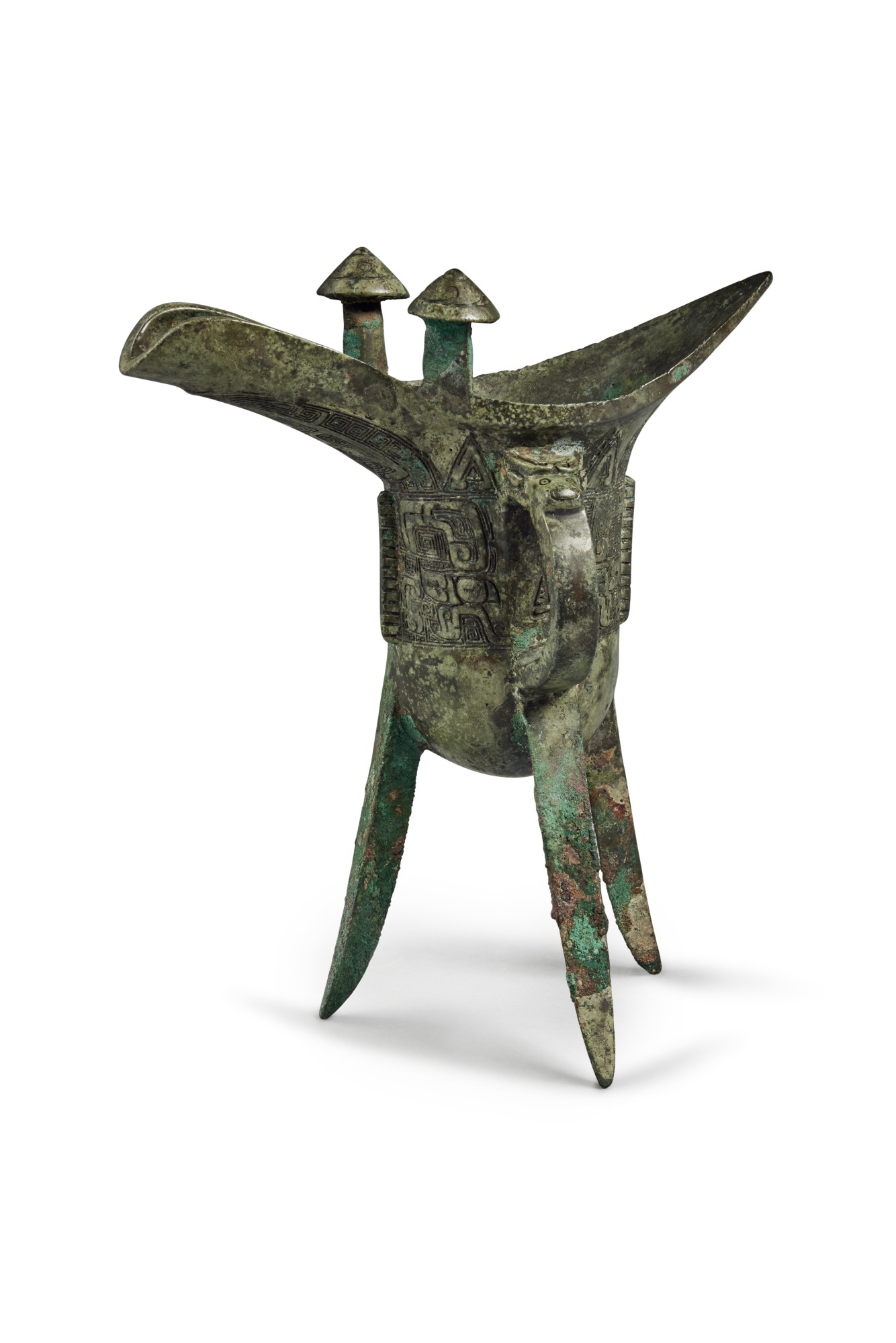 An inscribed archaic bronze ritual wine vessel (Jue), Late Shang ...