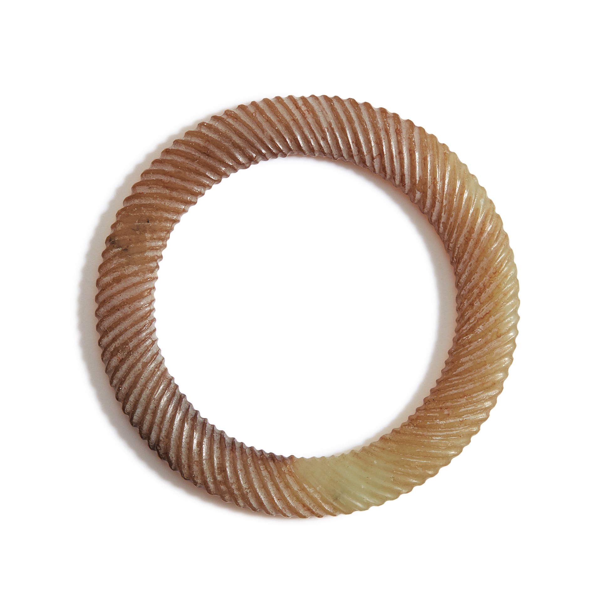 A JADE 'TWISTED ROPE' ORNAMENTAL RING-DISC, EASTERN ZHOU DYNASTY OR ...