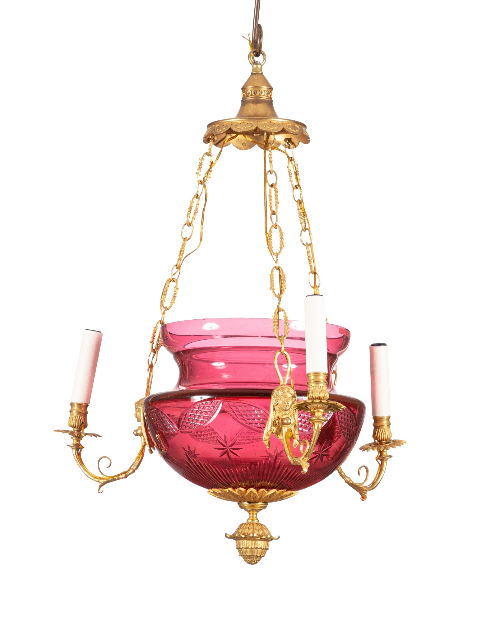 A gilt bronze and red tinted glass chandelier, in the neoclassical ...