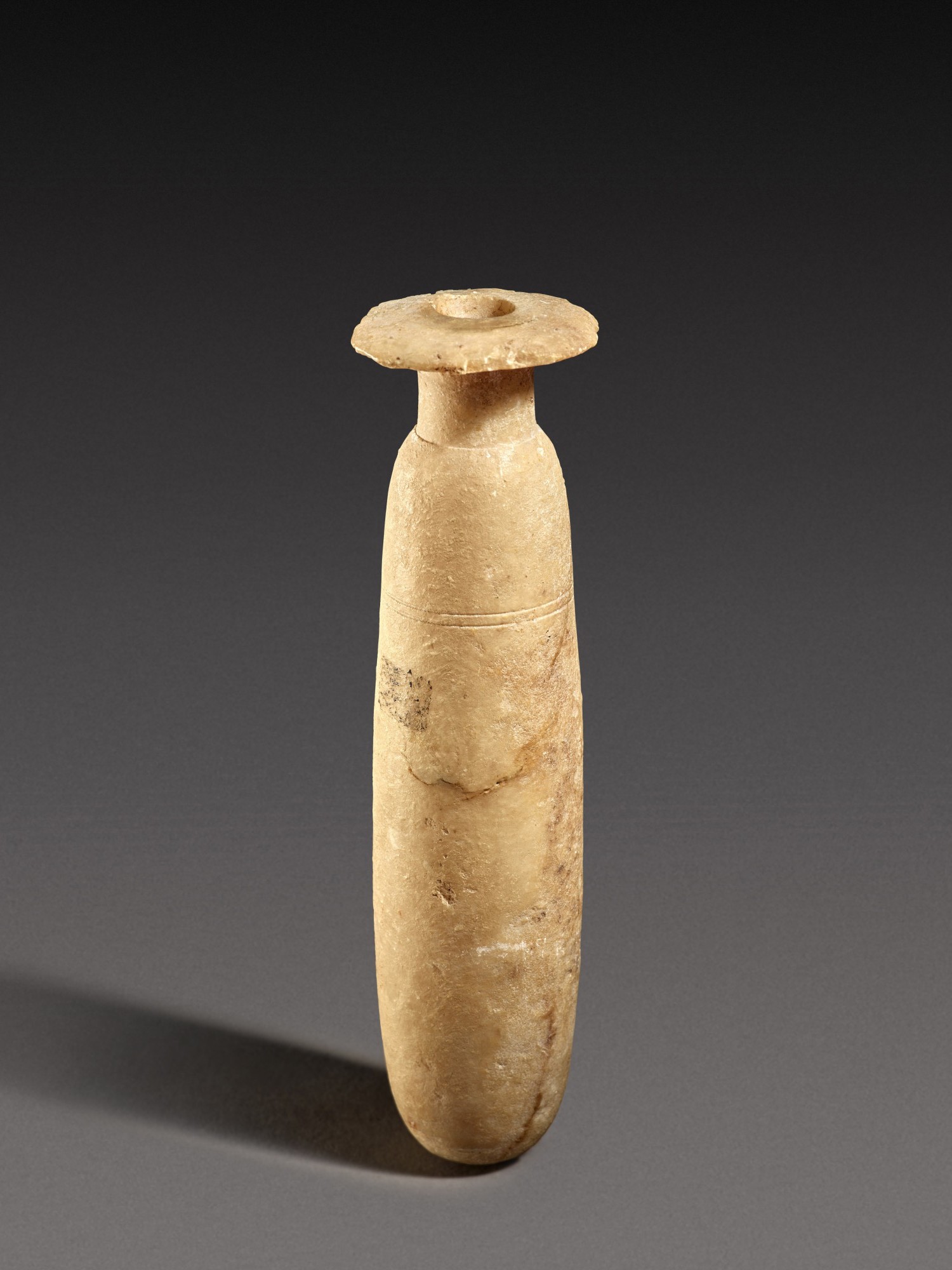 A Hellenistic Gypsum Alabaster Alabastron, circa 3rd Century B.C., or ...