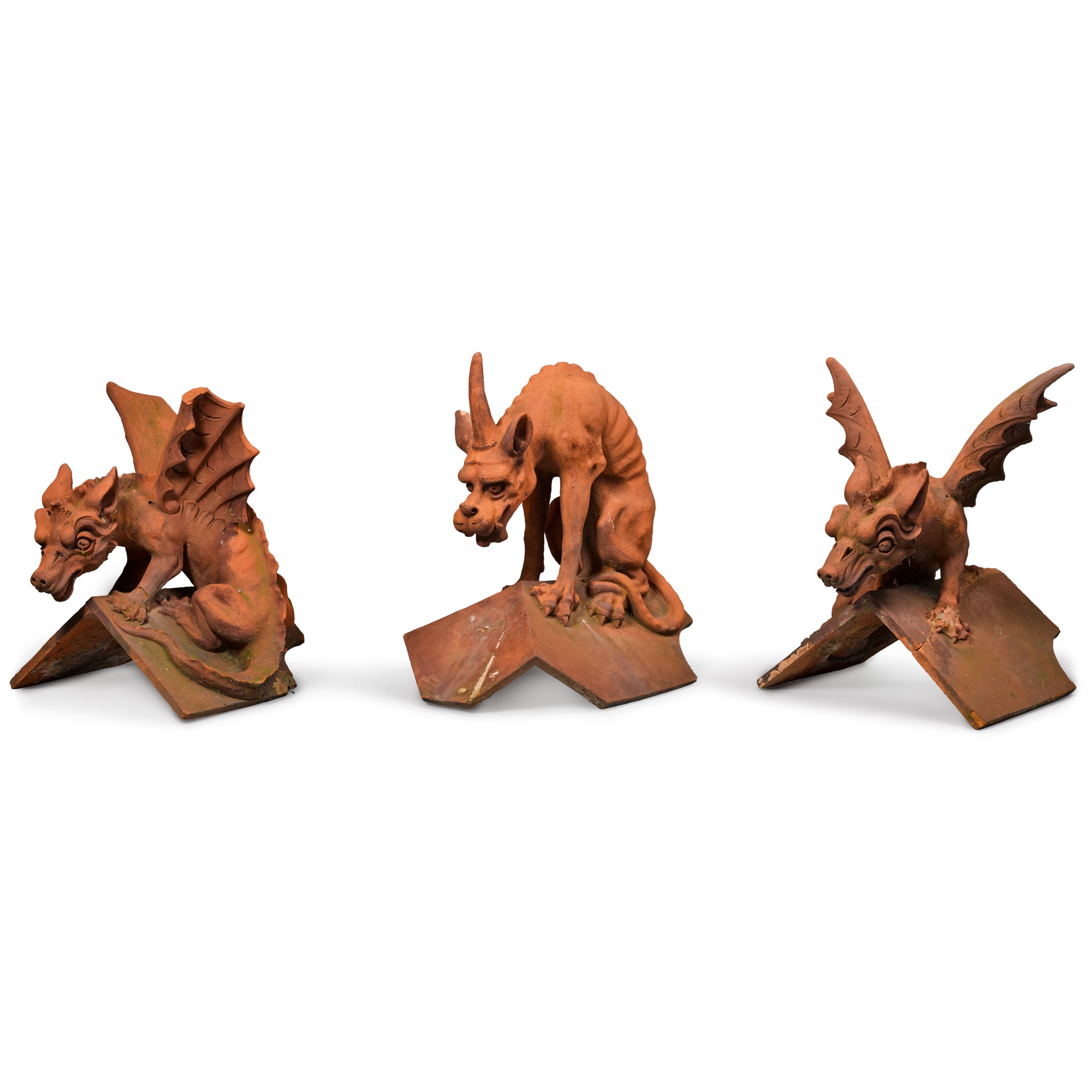 A set of three Victorian terracotta ridge tiles, late 19th/early 20th ...