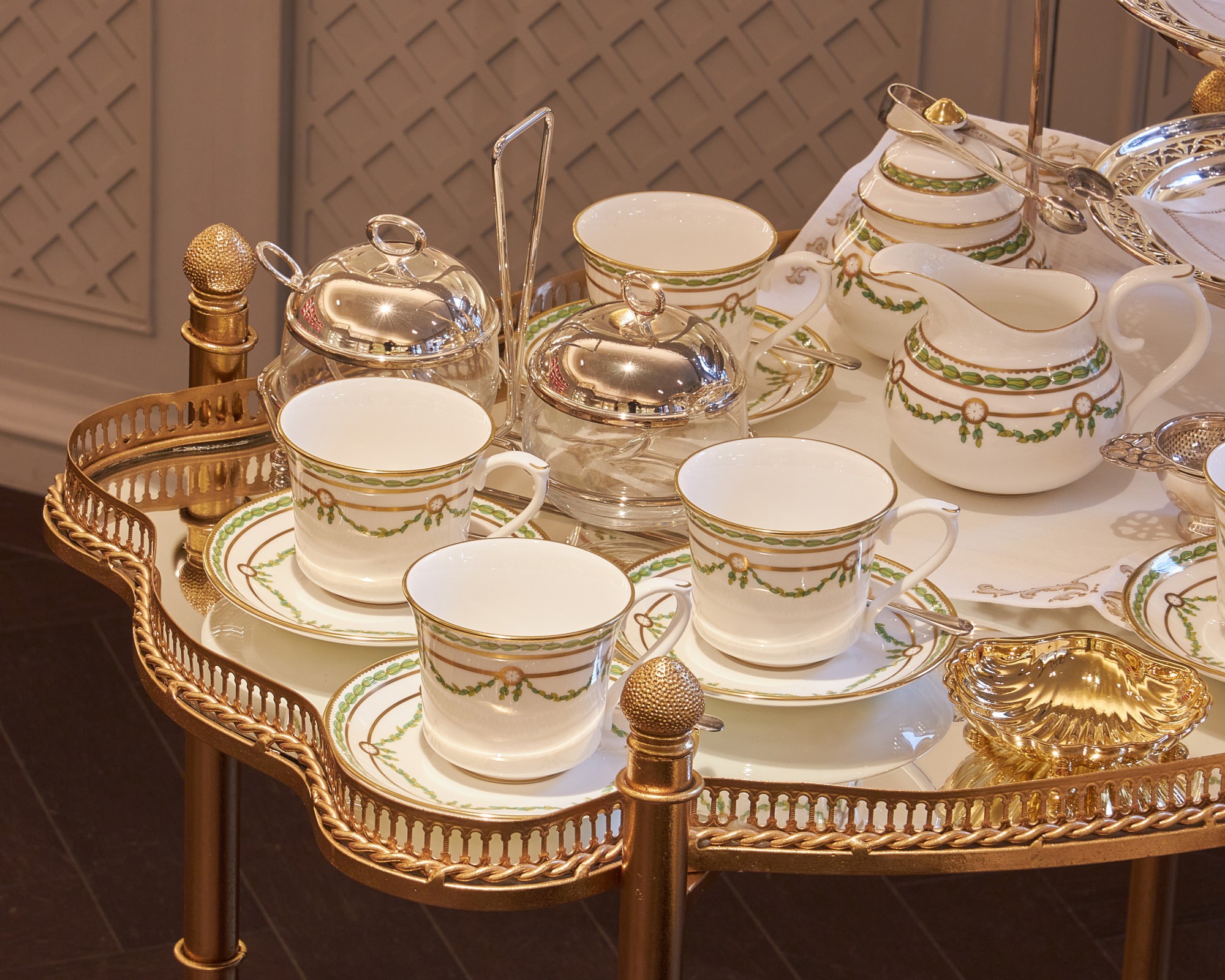 A Thomas Goode 'Green Garland' bone china part tea service, various ...