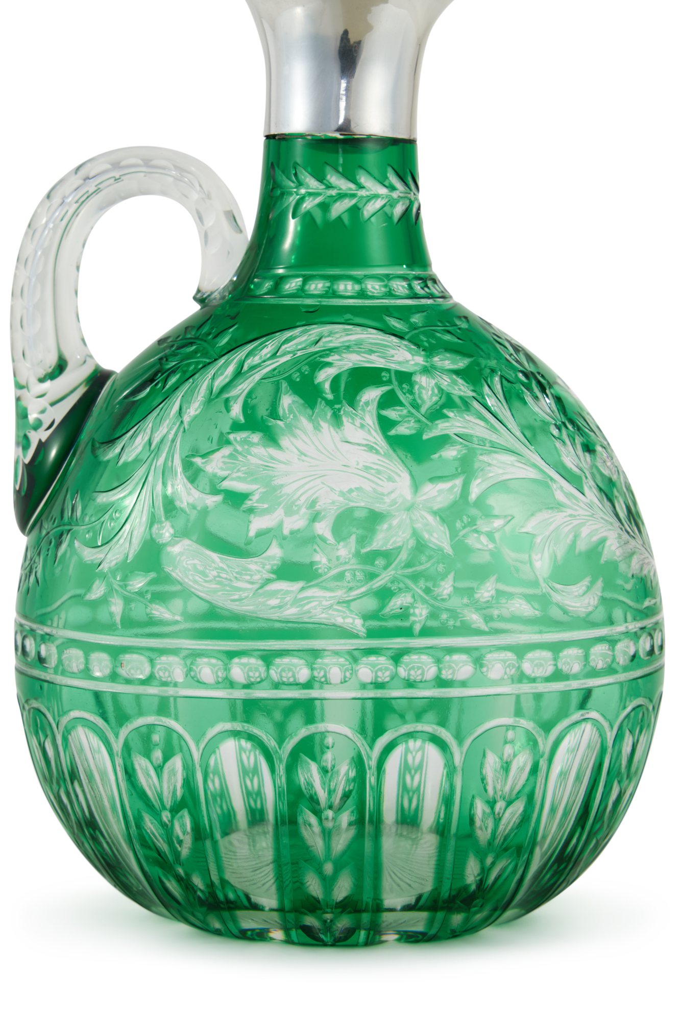 An English Intaglio-Cut Overly Cased Green Glass Claret Jug with ...