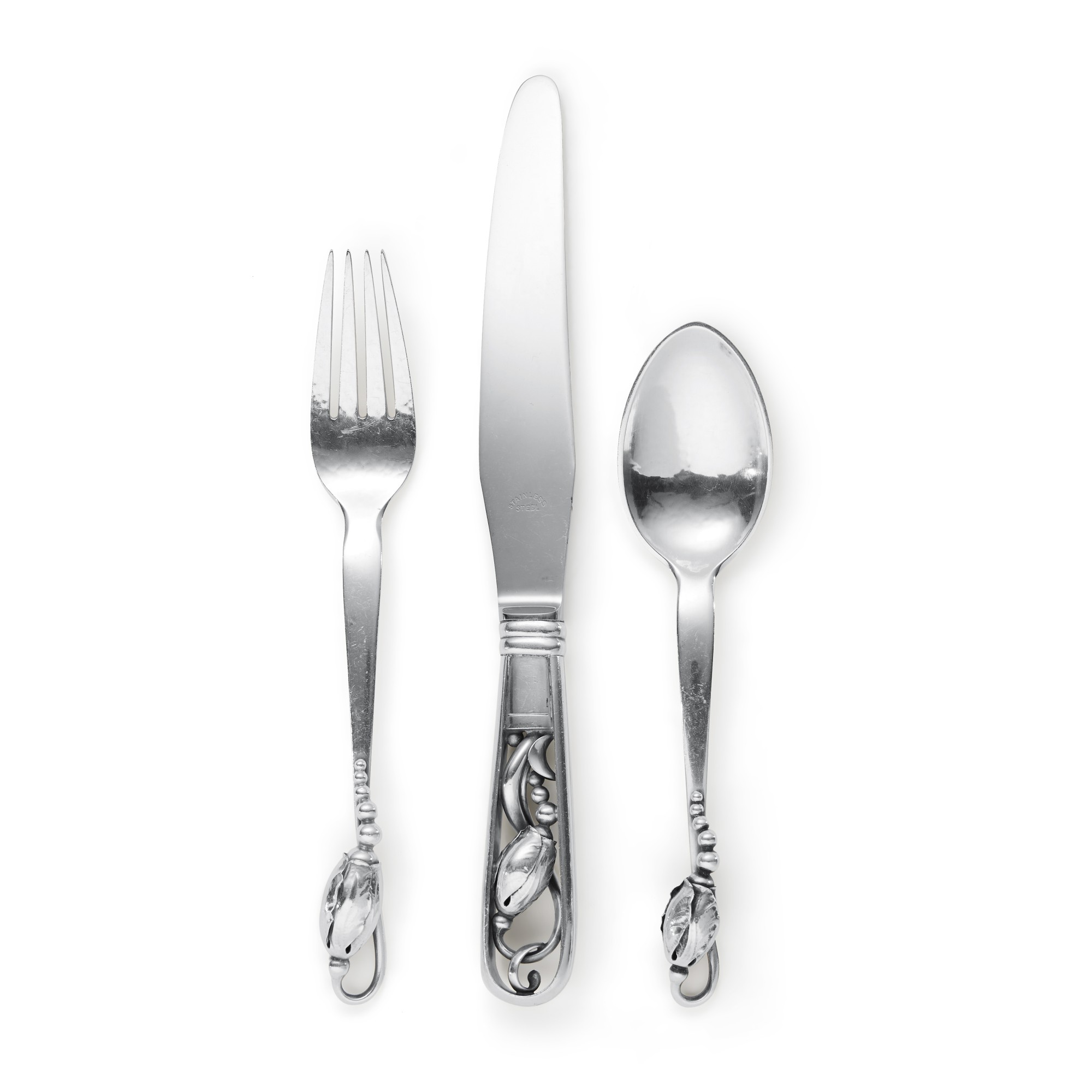 A rare Danish silver Blossom pattern flatware service, No. 84, Georg ...