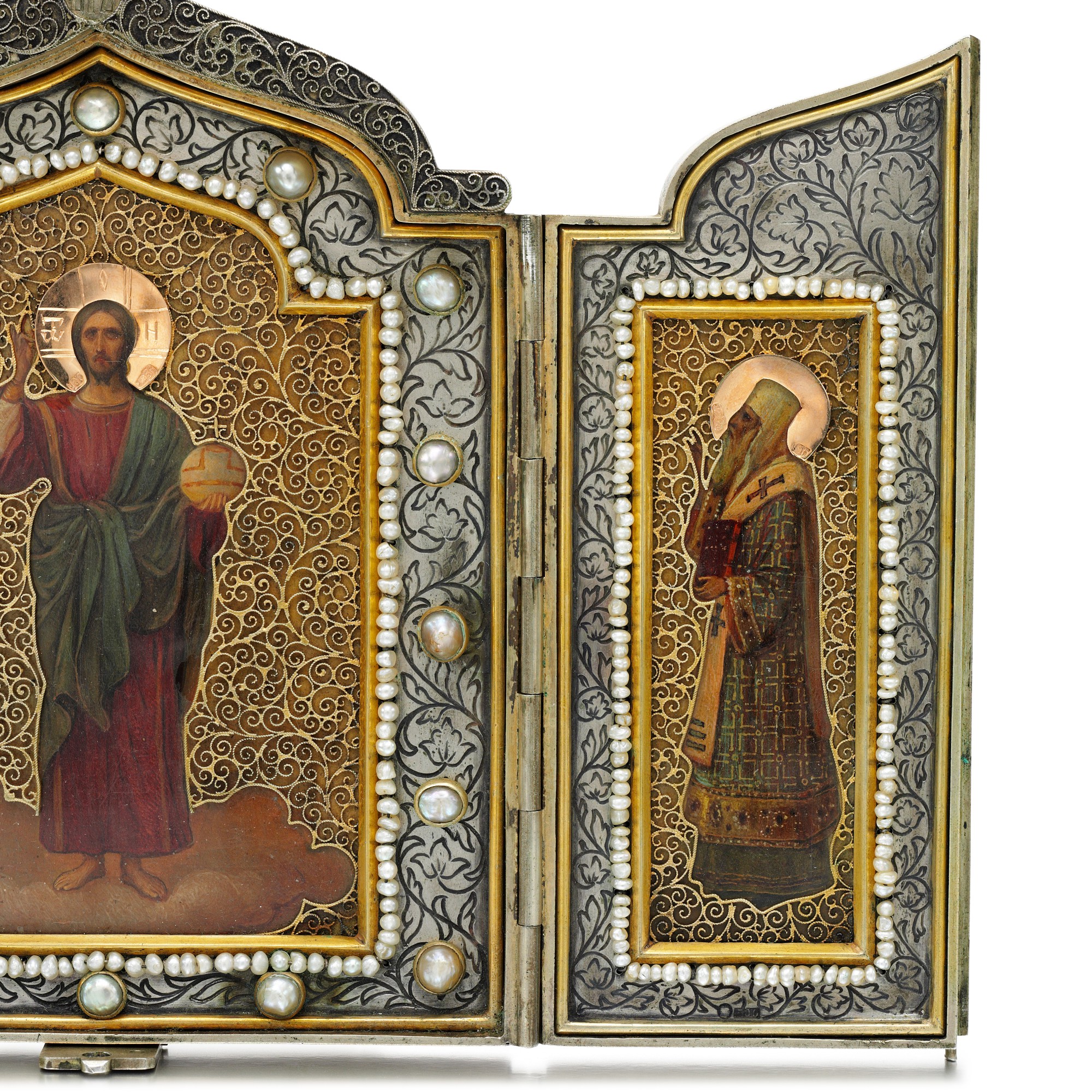 A PARCEL-GILT GOLD, SILVER AND PEARL-SET TRIPTYCH ICON, OLOVYANISHNIKOV AND SONS, MOSCOW, 1908 ...