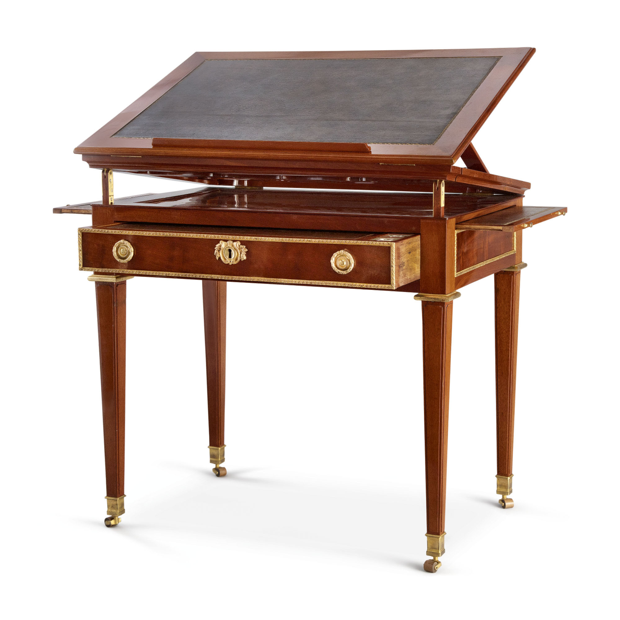 A LOUIS XVI GILT BRONZE-MOUNTED MAHOGANY TABLE A LA TRONCHIN BY ...