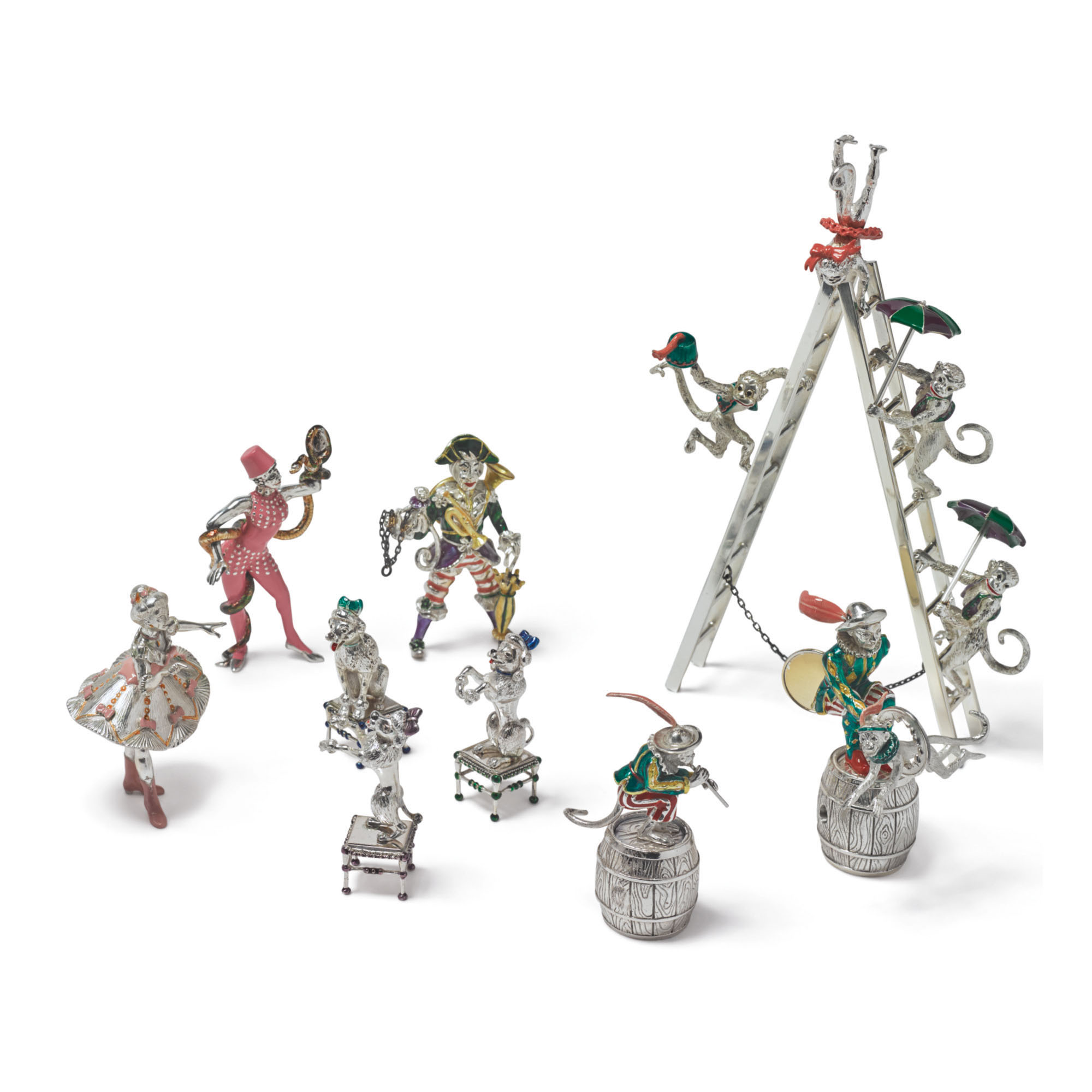 ANIMAL TRAINERS: A GROUP OF SILVER AND ENAMEL CIRCUS FIGURES, DESIGNED ...