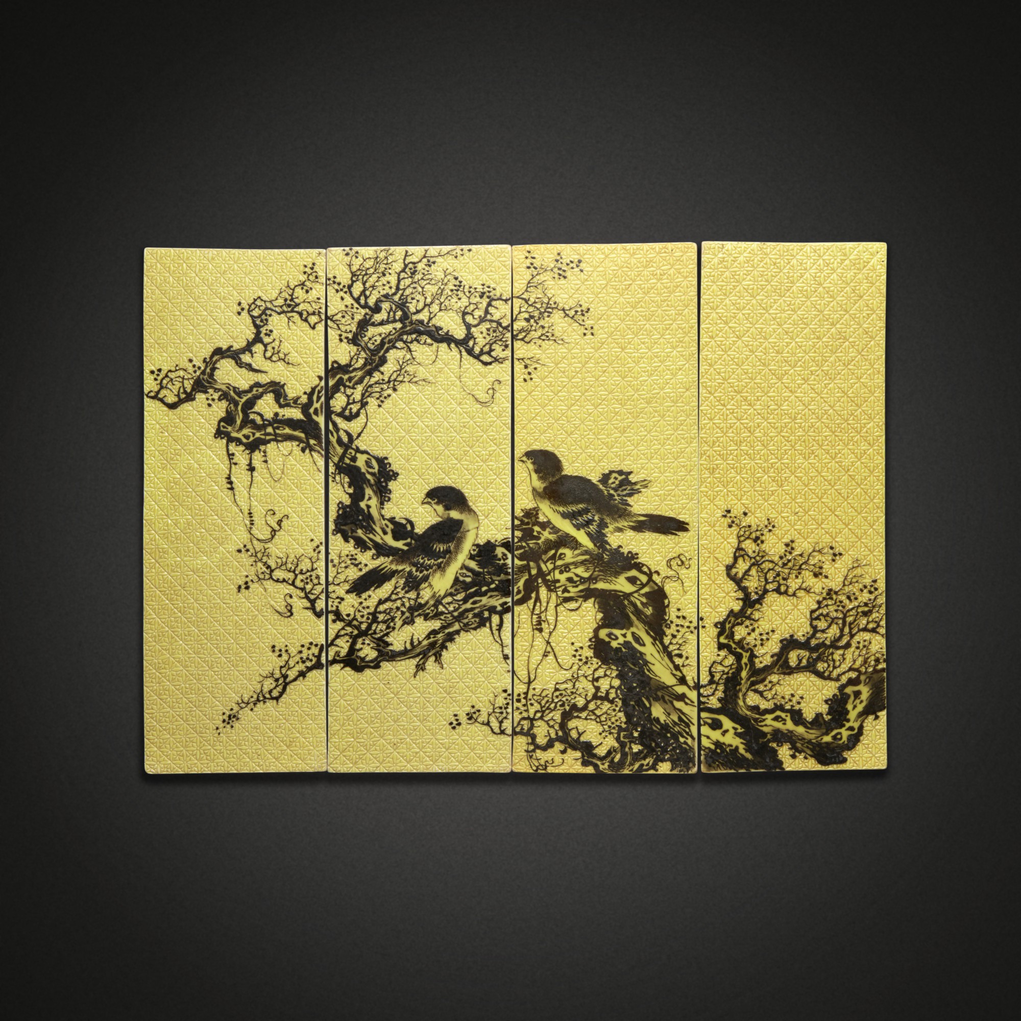 A set of four molded yellow-ground grisaille-painted 'prunus and magpie ...