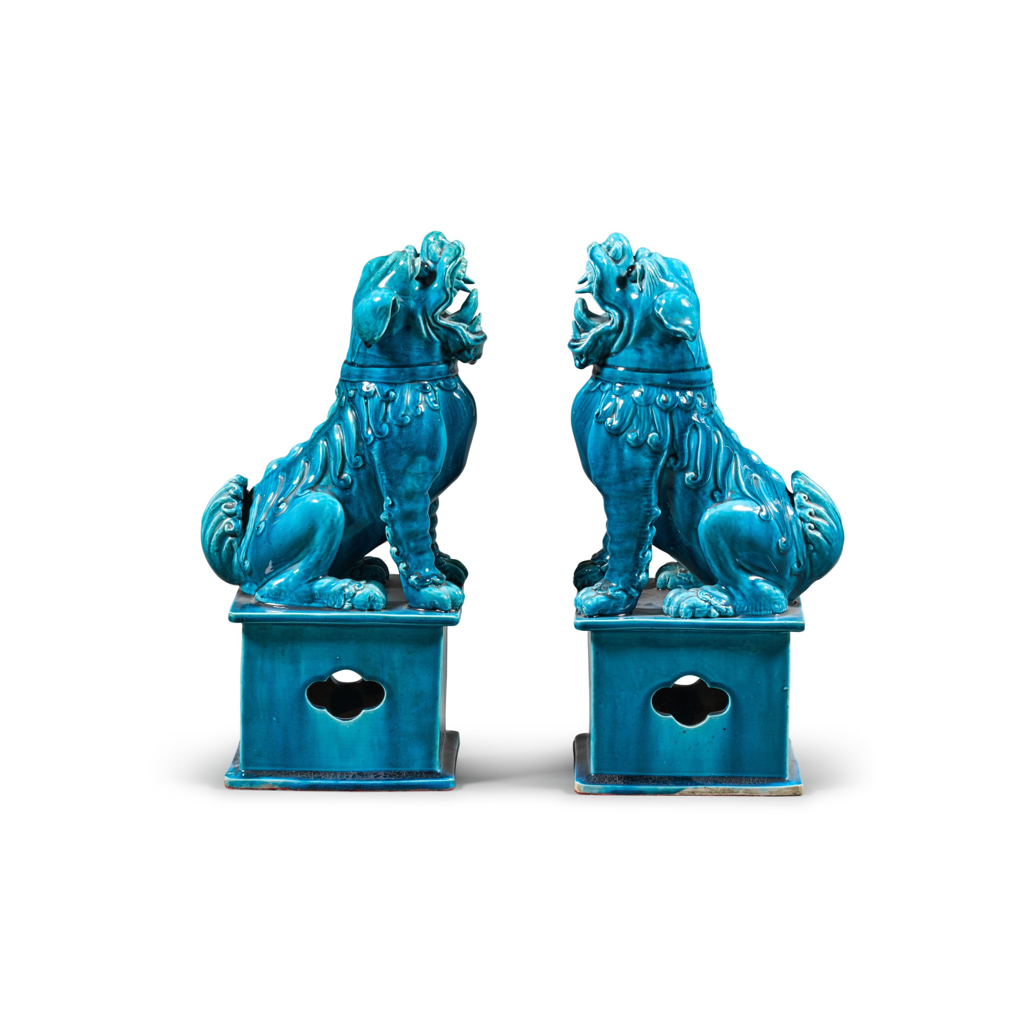 A pair of Chinese turquoise-glazed Buddhist lions, Qing dynasty, 19th ...