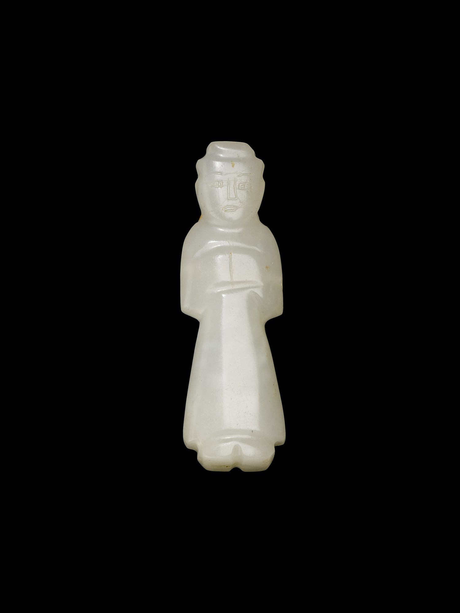 A white jade miniature figure of a standing man, Wengzhong, Han dynasty ...