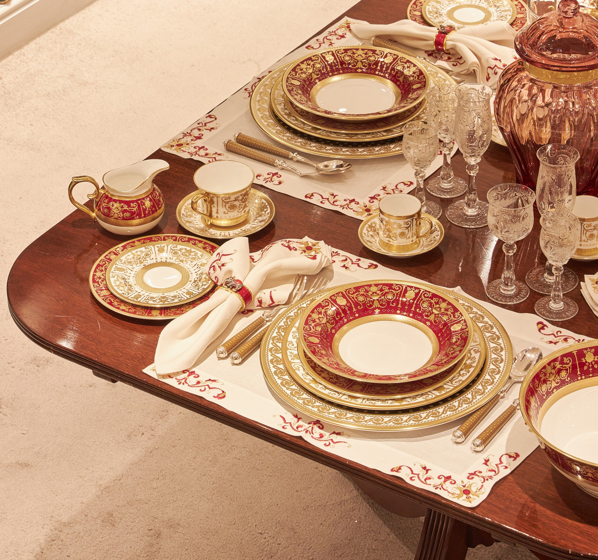 A Thomas Goode 'Florette Ruby' bone china dinner and dessert service ...