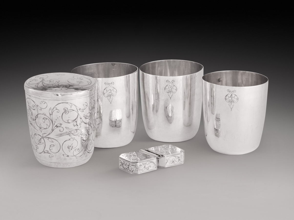 A set of William and Mary silver nesting beakers and spice box, FS over ...
