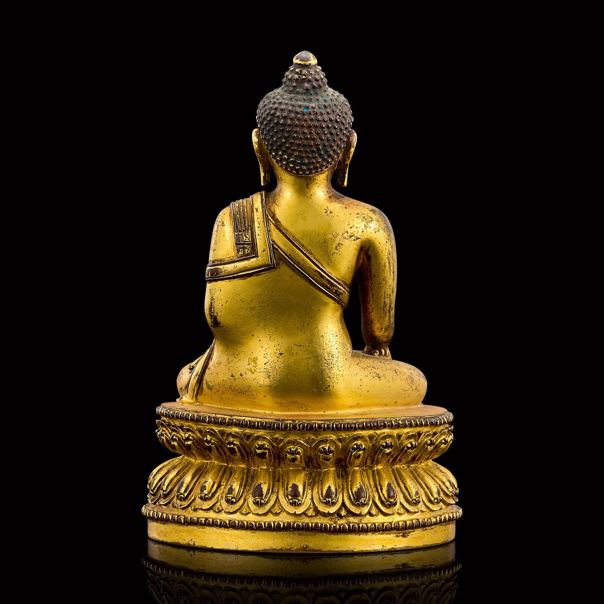 A gilt-bronze figure of Shakyamuni Buddha Mark and period of Yongle | 明 ...