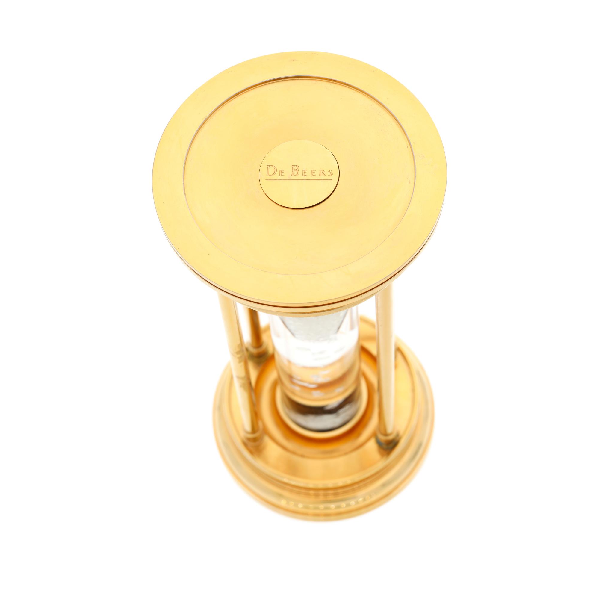 A gilt brass hourglass with floating diamonds, Circa 2000 | Fine ...