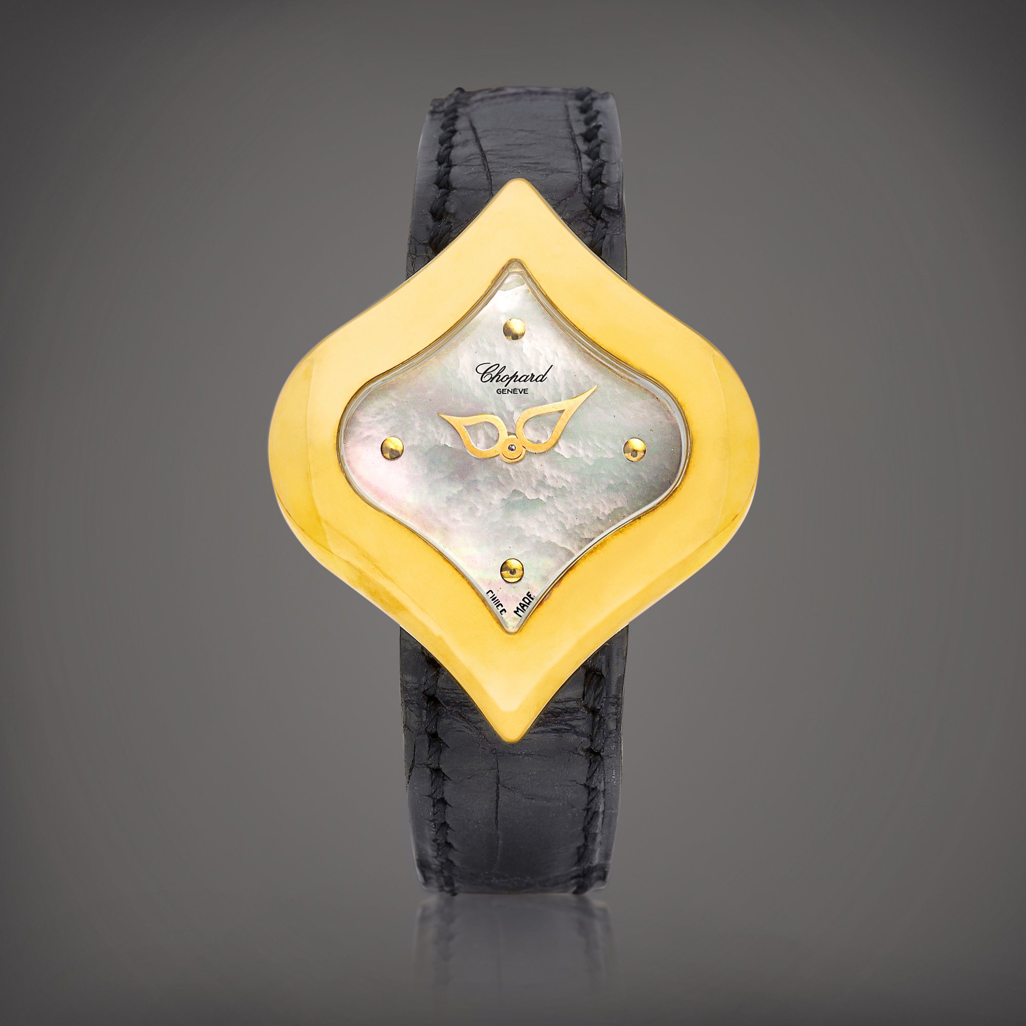 Pushkin, Reference 12/7412 | A yellow gold wristwatch with mother-of ...