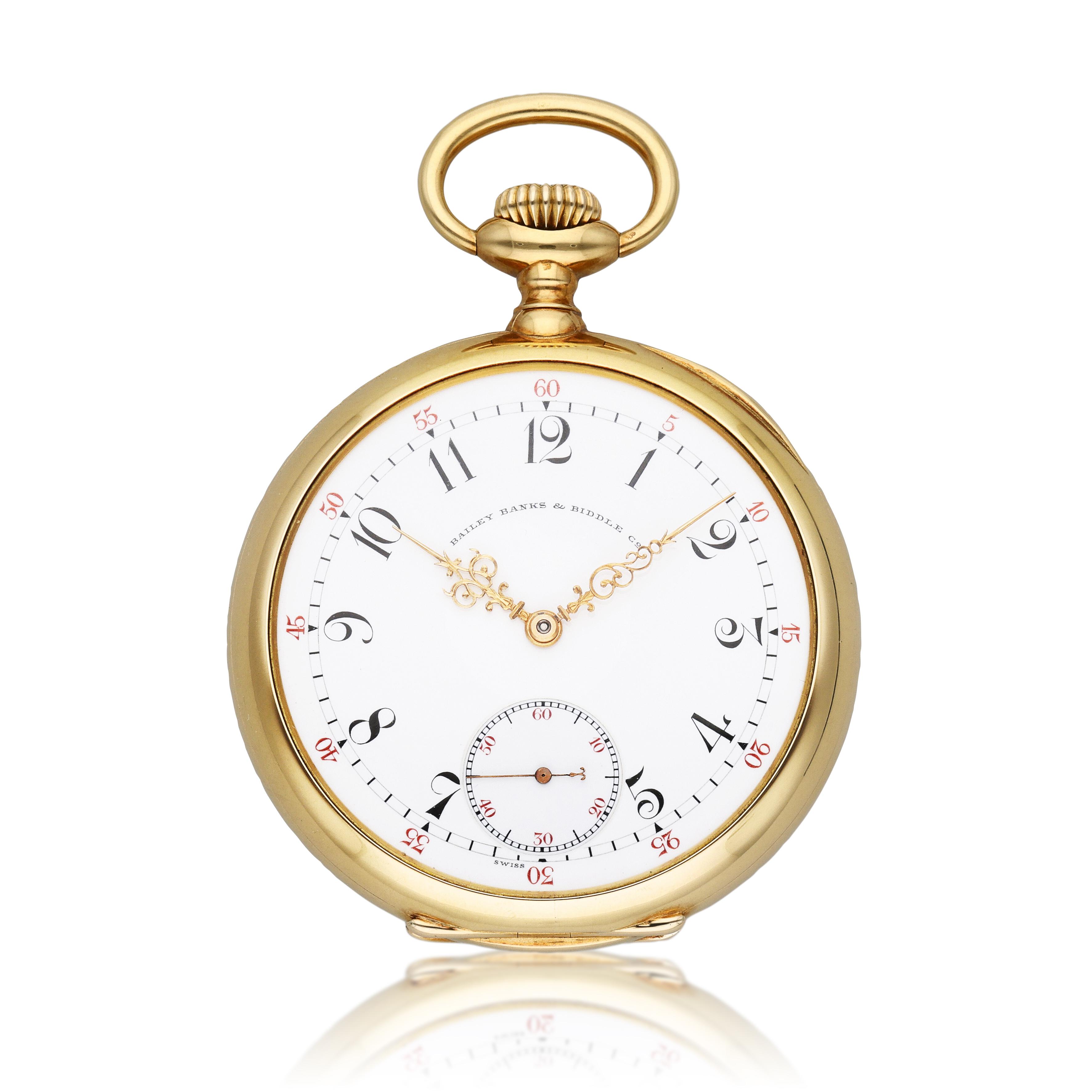 Retailed by Bailey Banks & Biddle Co.: A yellow gold open faced watch ...