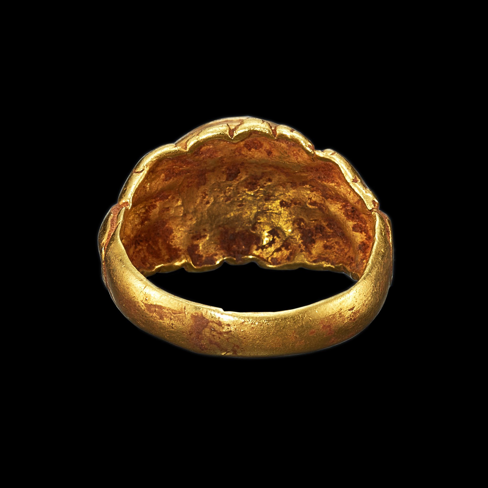 A solid gold ring with floral shank and engraved 'Ankusa' symbol Java ...