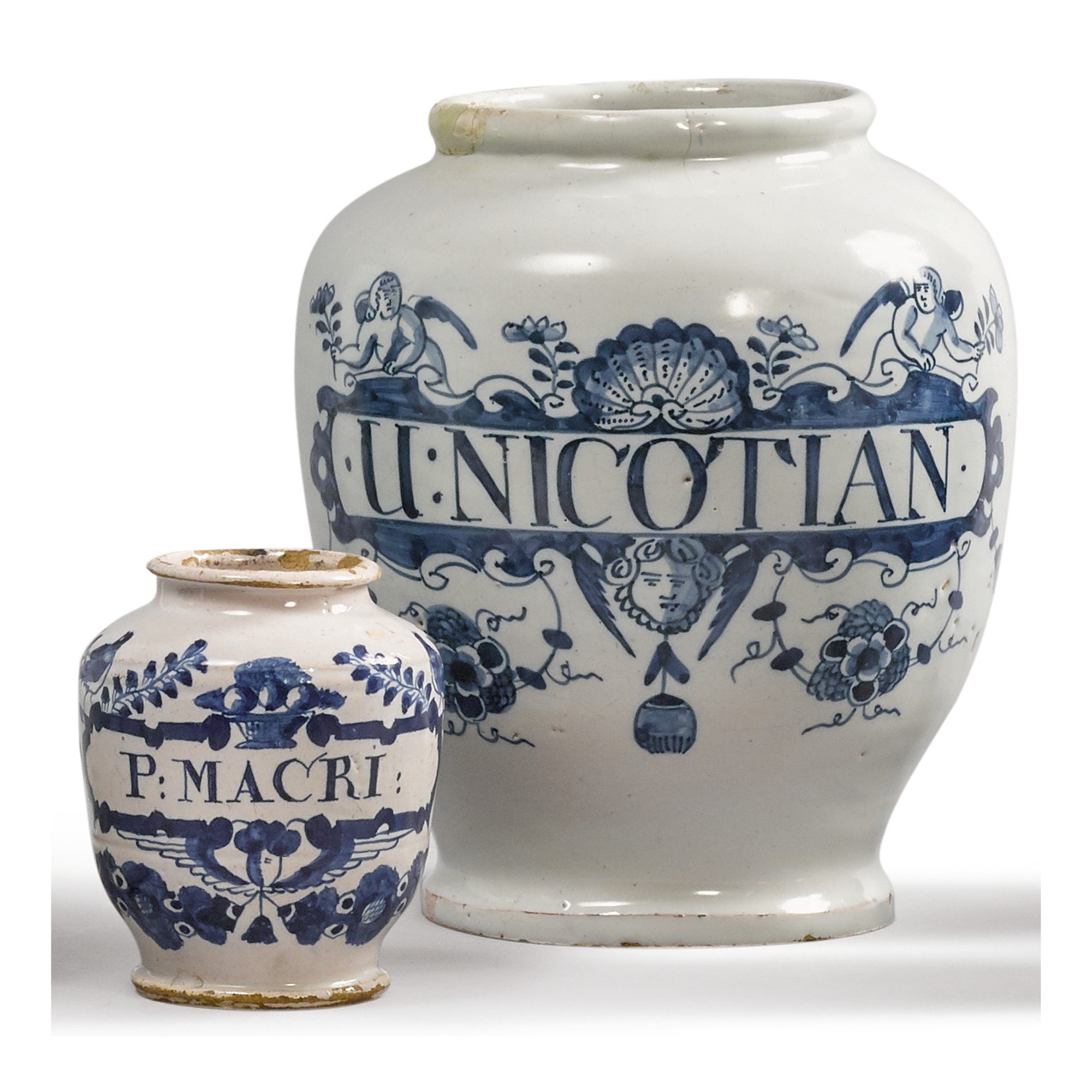 AN ENGLISH DELFTWARE BLUE AND WHITE DRUG JAR AND A SMALL PILL JAR ...