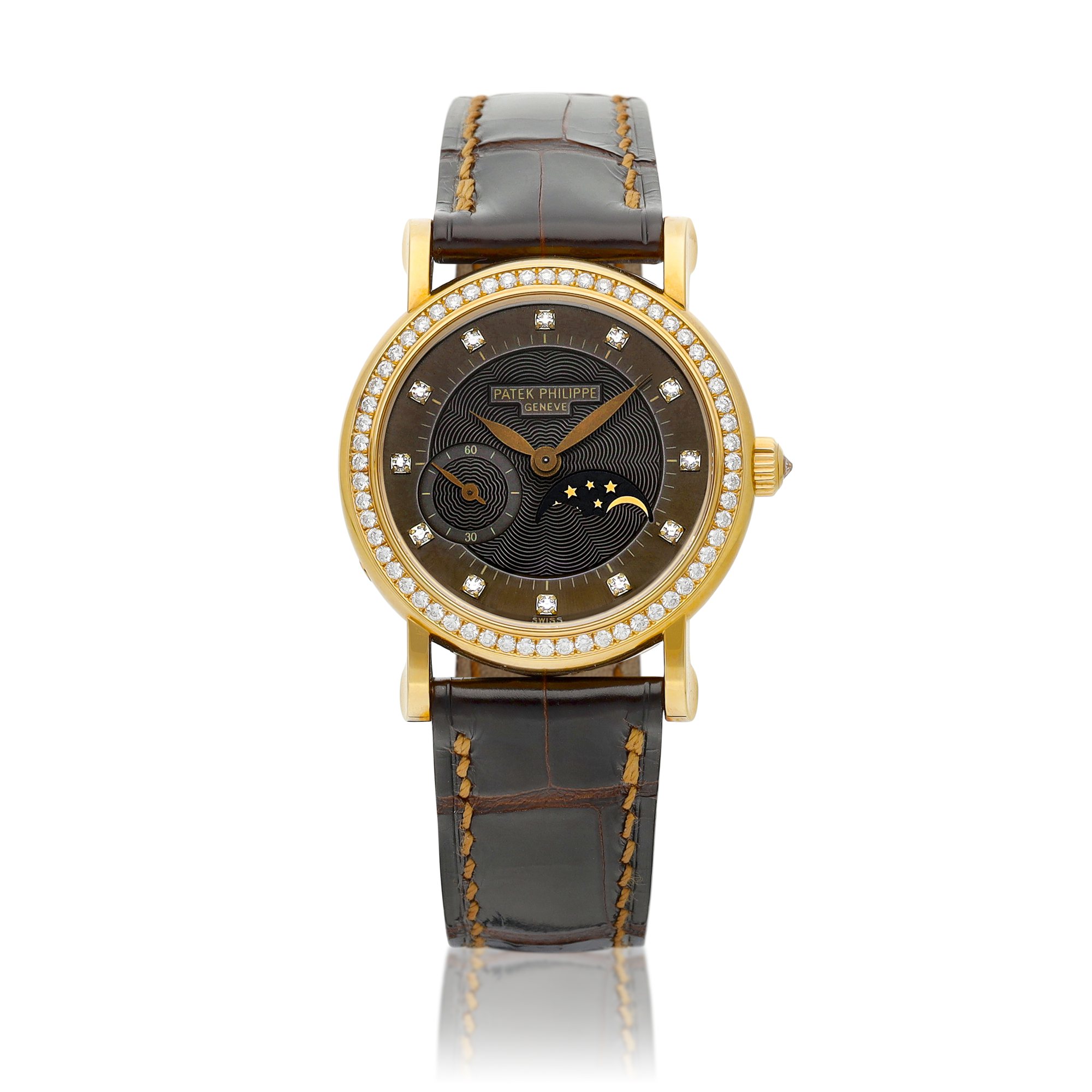 Reference 4858 | A yellow gold and diamond-set wristwatch with moon ...